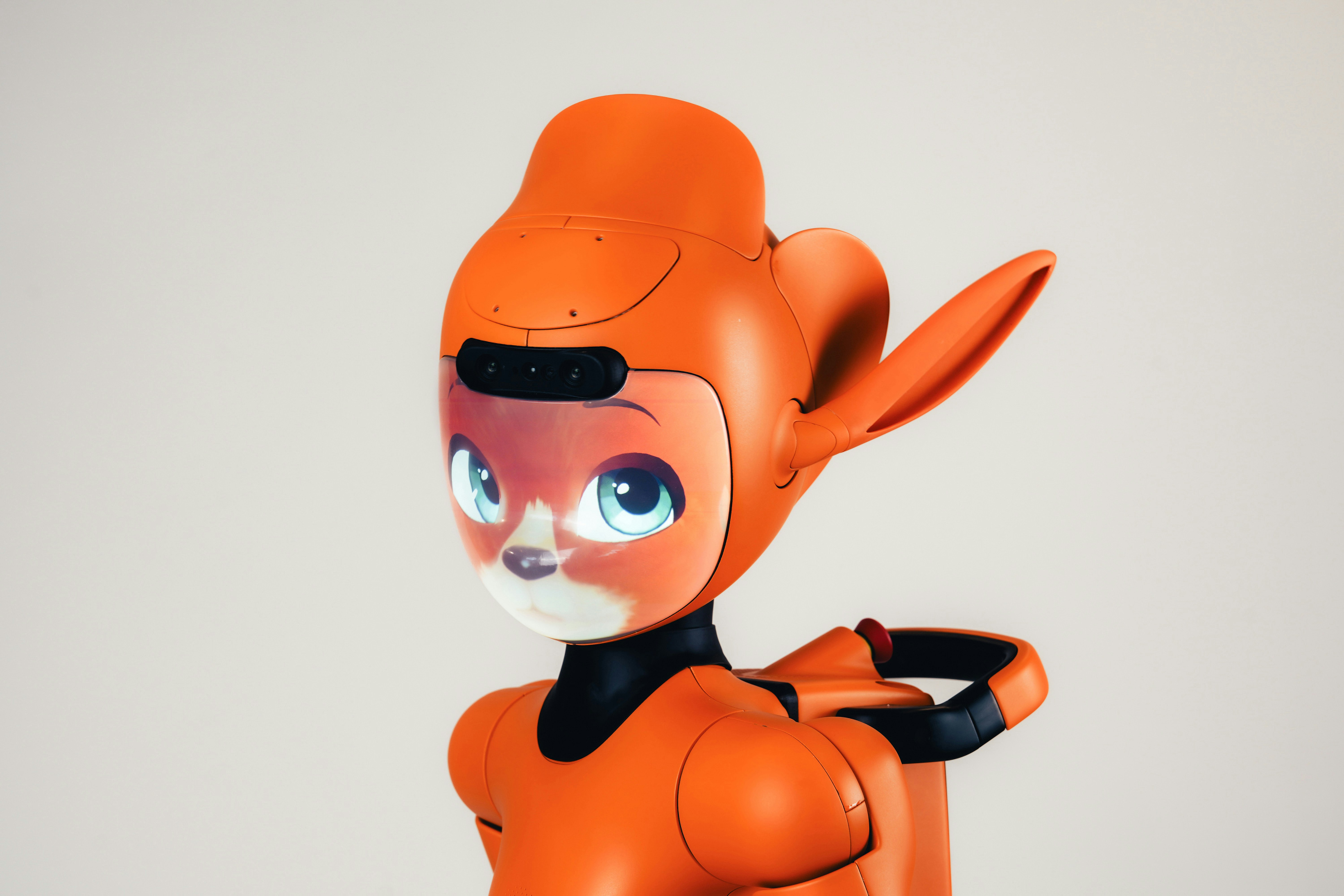 Orange Android: A Close-Up of a Robotic Character's Expressive Face