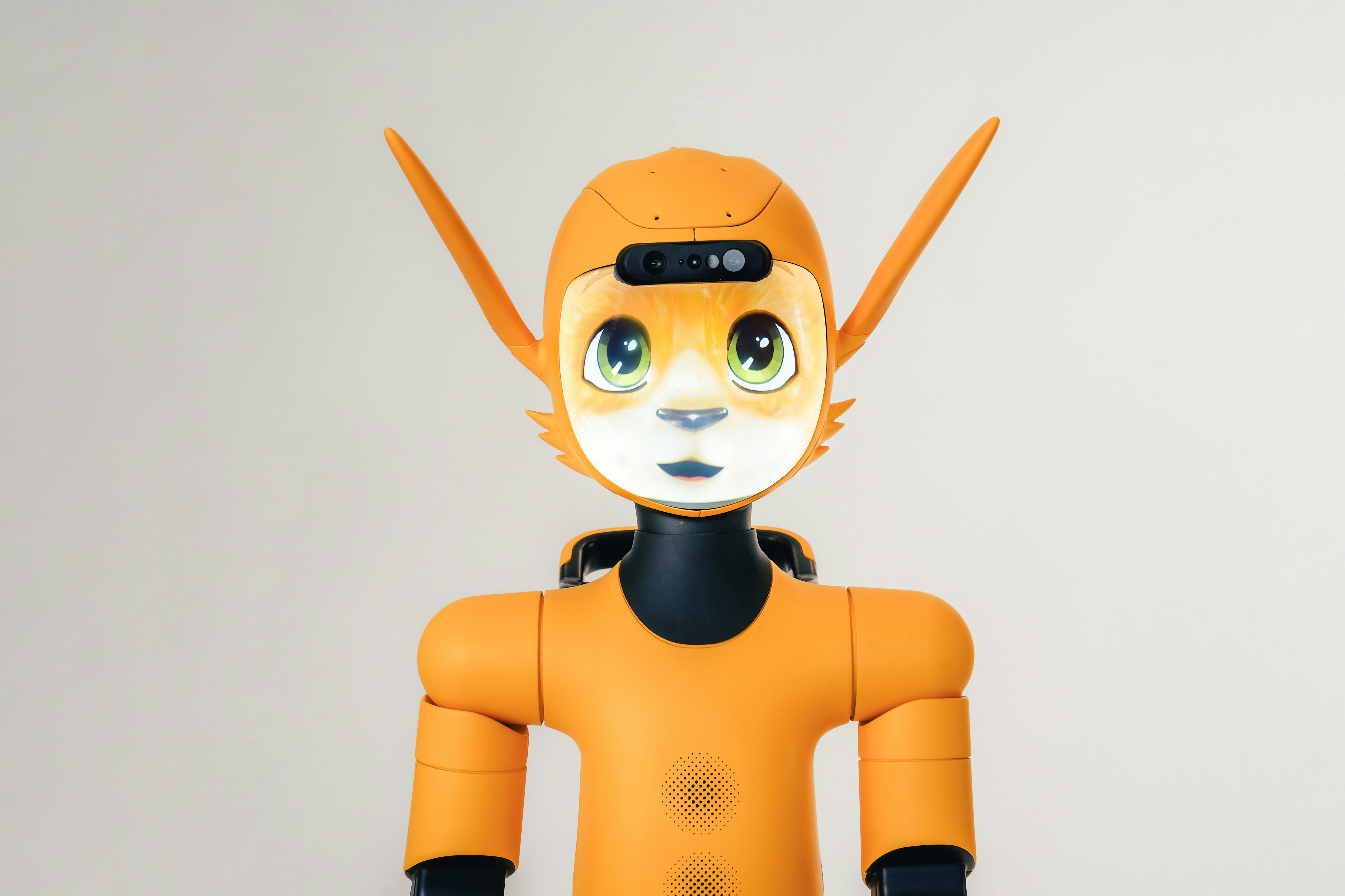 Orange Sentinel: A Robotic Portrait with Wide-Eyed Glee