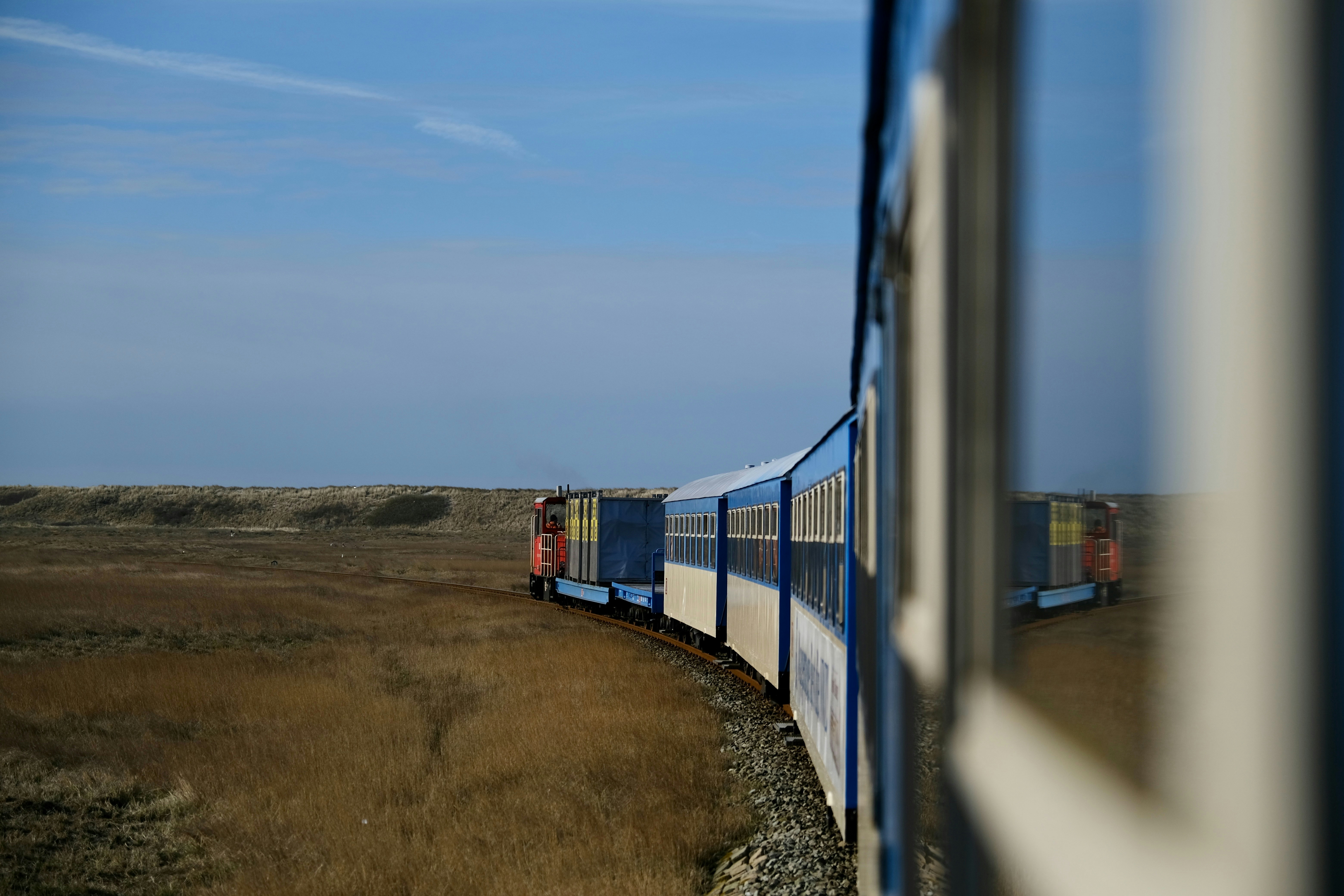 Blue Express: A Curving Journey Through Open Plains