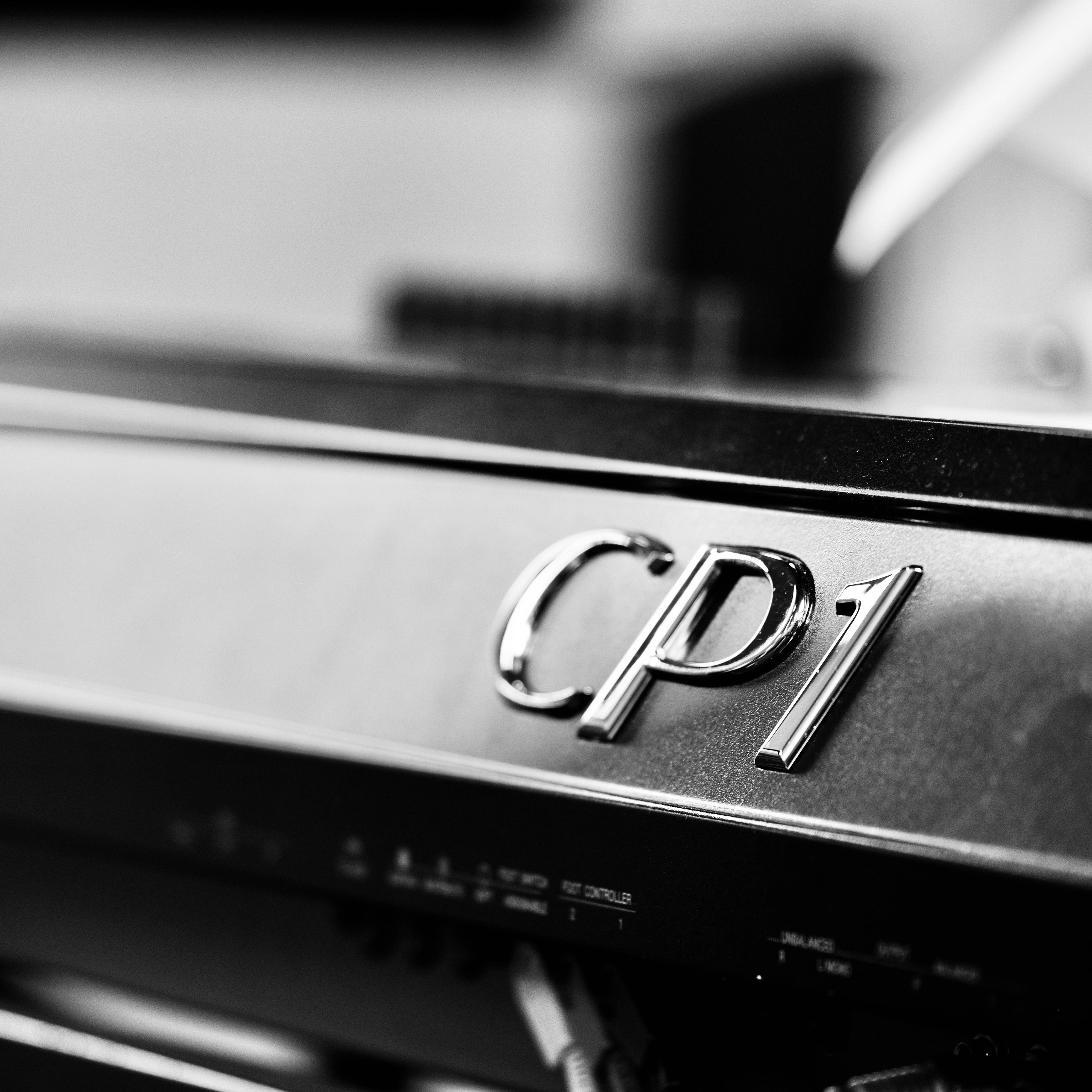 Macro Majesty: The CP1 Crest on a Chrome Surface