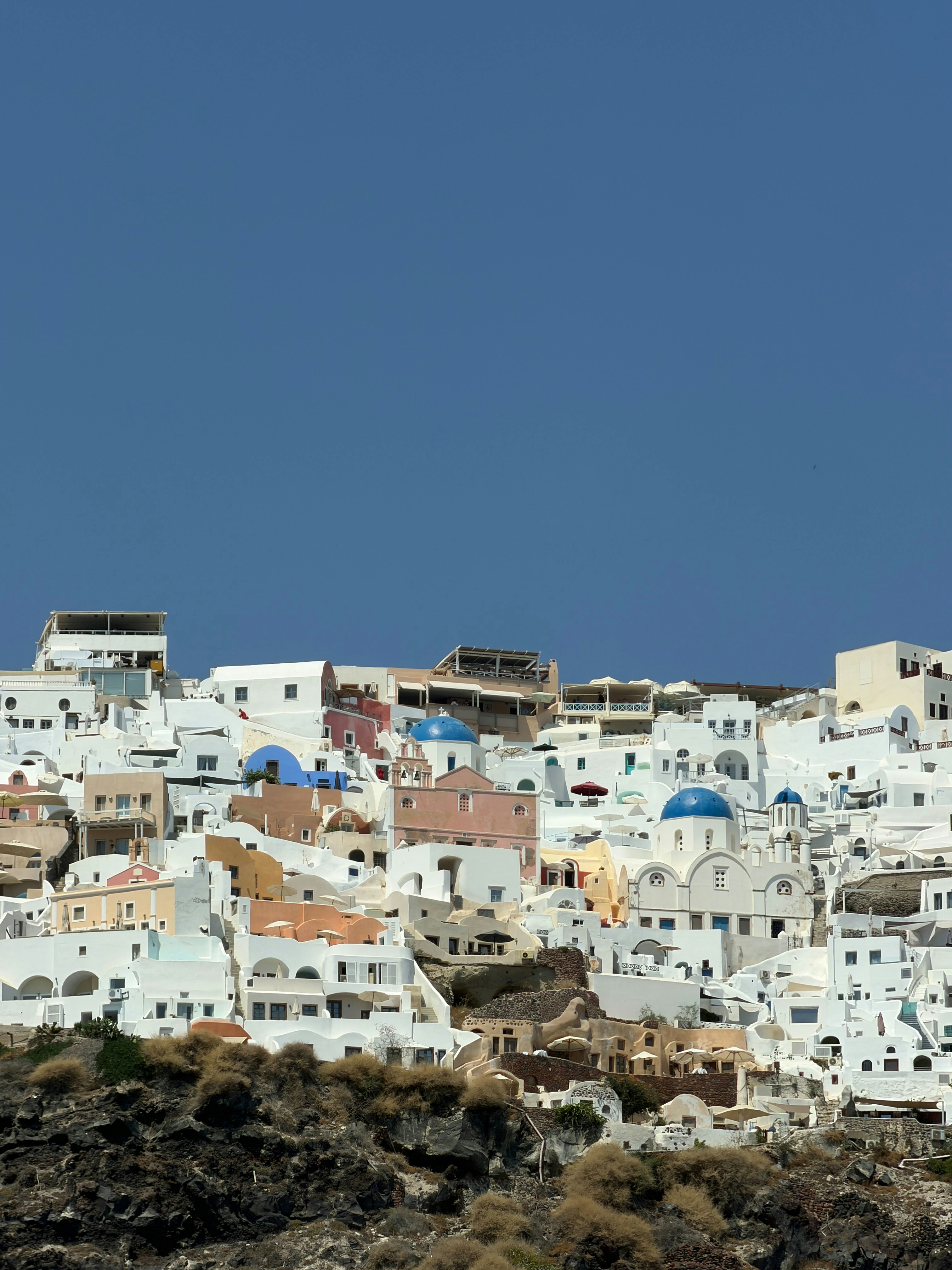 Aegean Village of Whitewashed Domes under Cerulean Sky