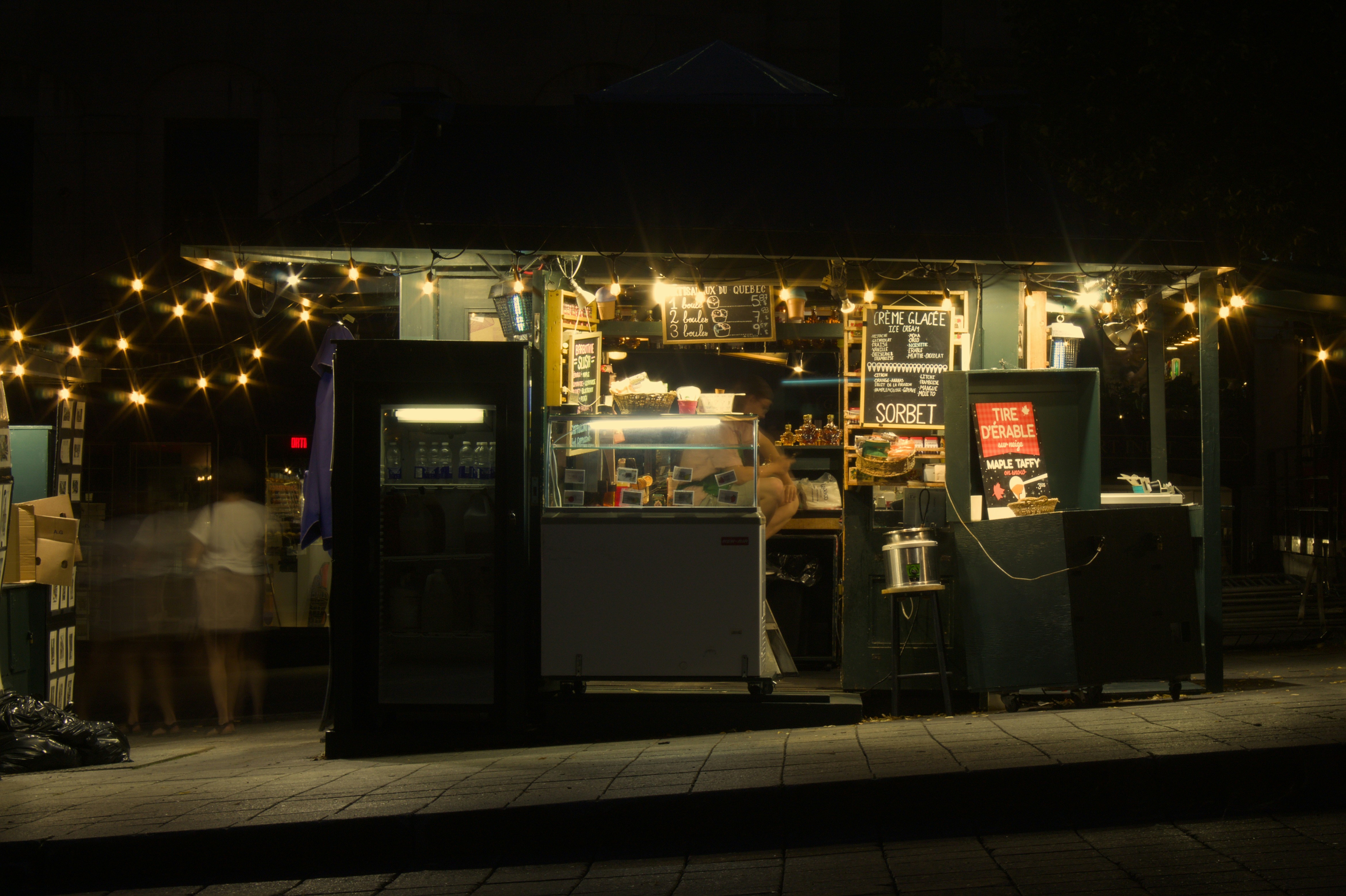 Warm Lights, Night Market: A Quiet Food Stand Glows