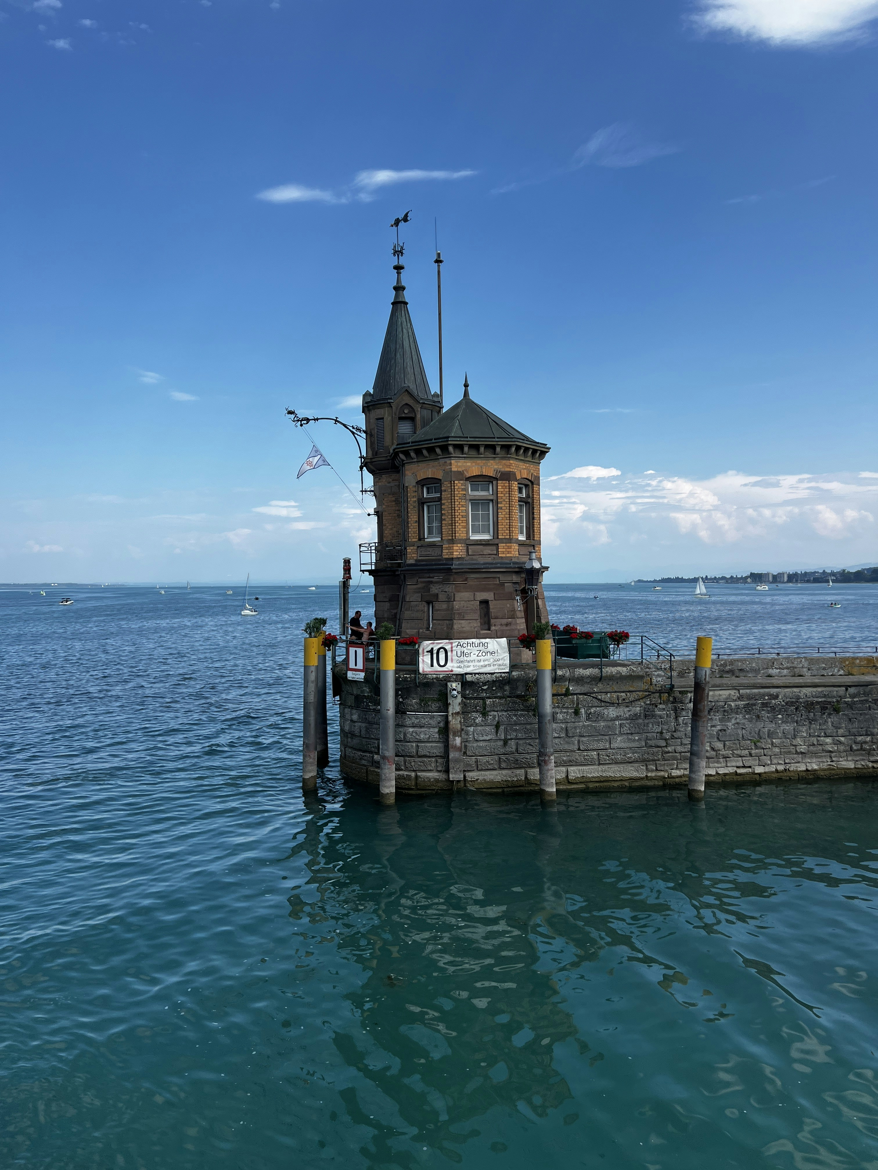 Stone Pavilion at the Edge of a Calm Lake