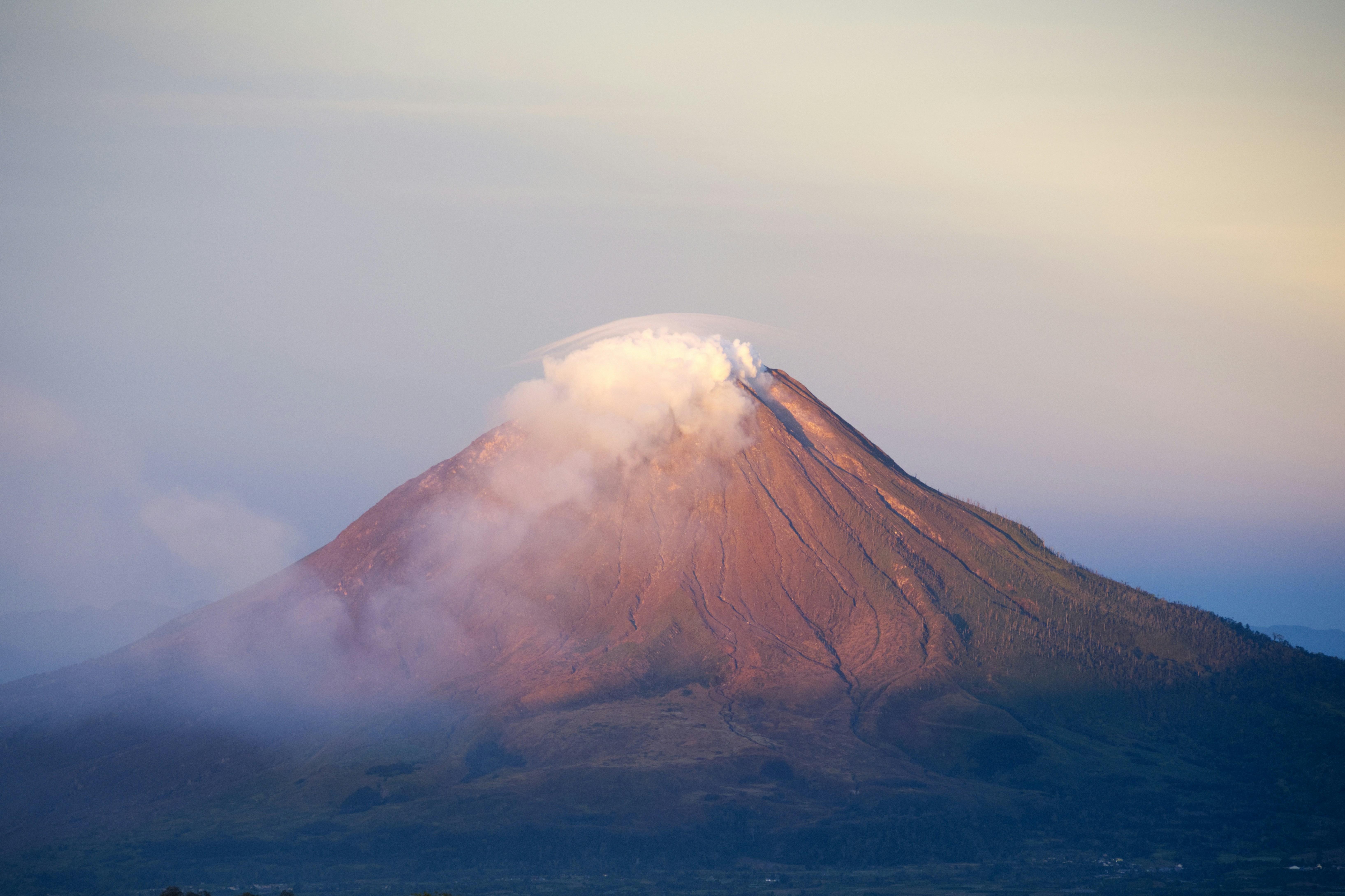 Mist-Sheathed Peak: Twilight Volcanic Silhouette