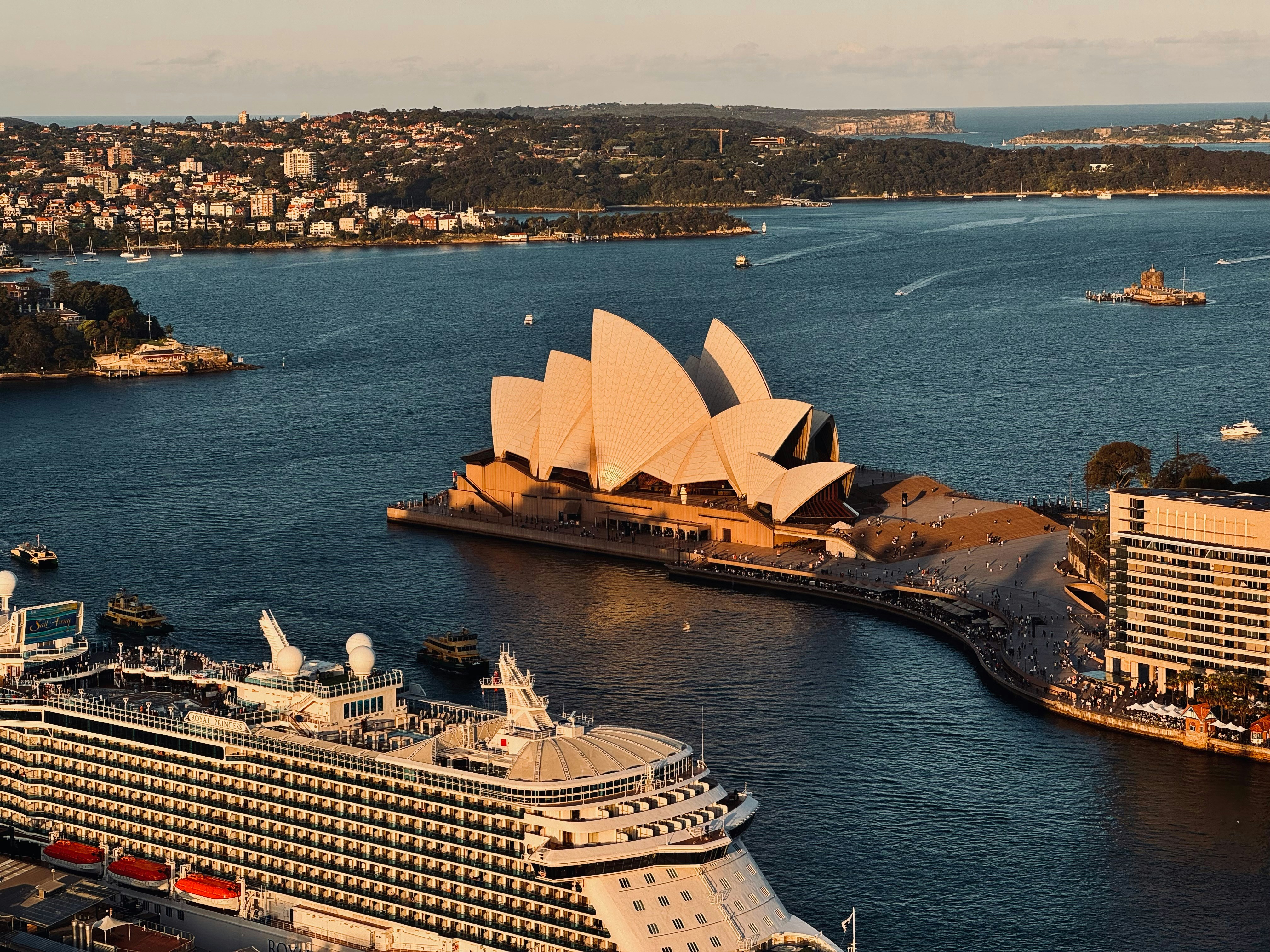 Harbor Jewel: Opera House Amid a Sea of Cruising Life
