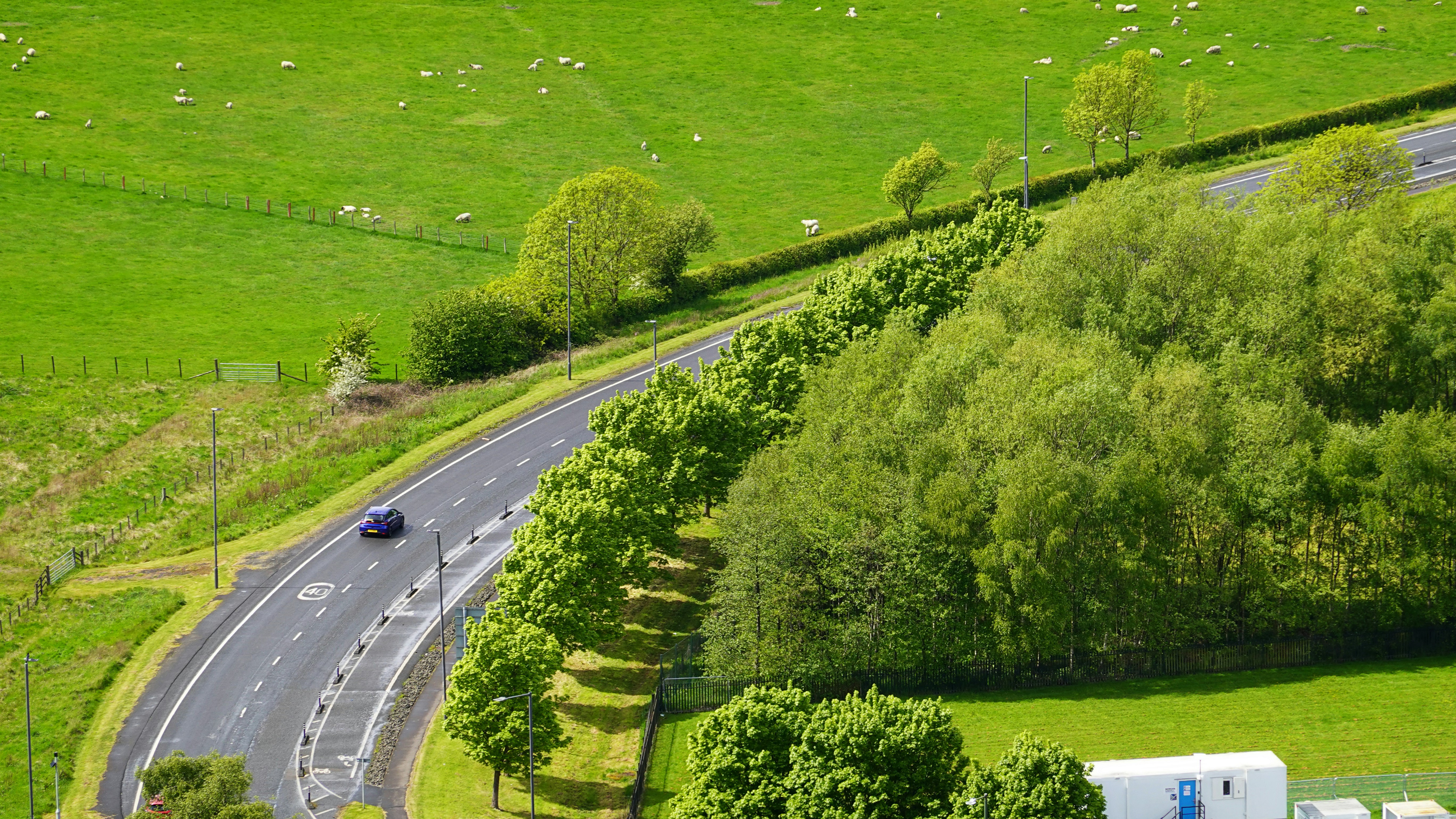 Curved Road Through Green Valley, Aerial Patchwork