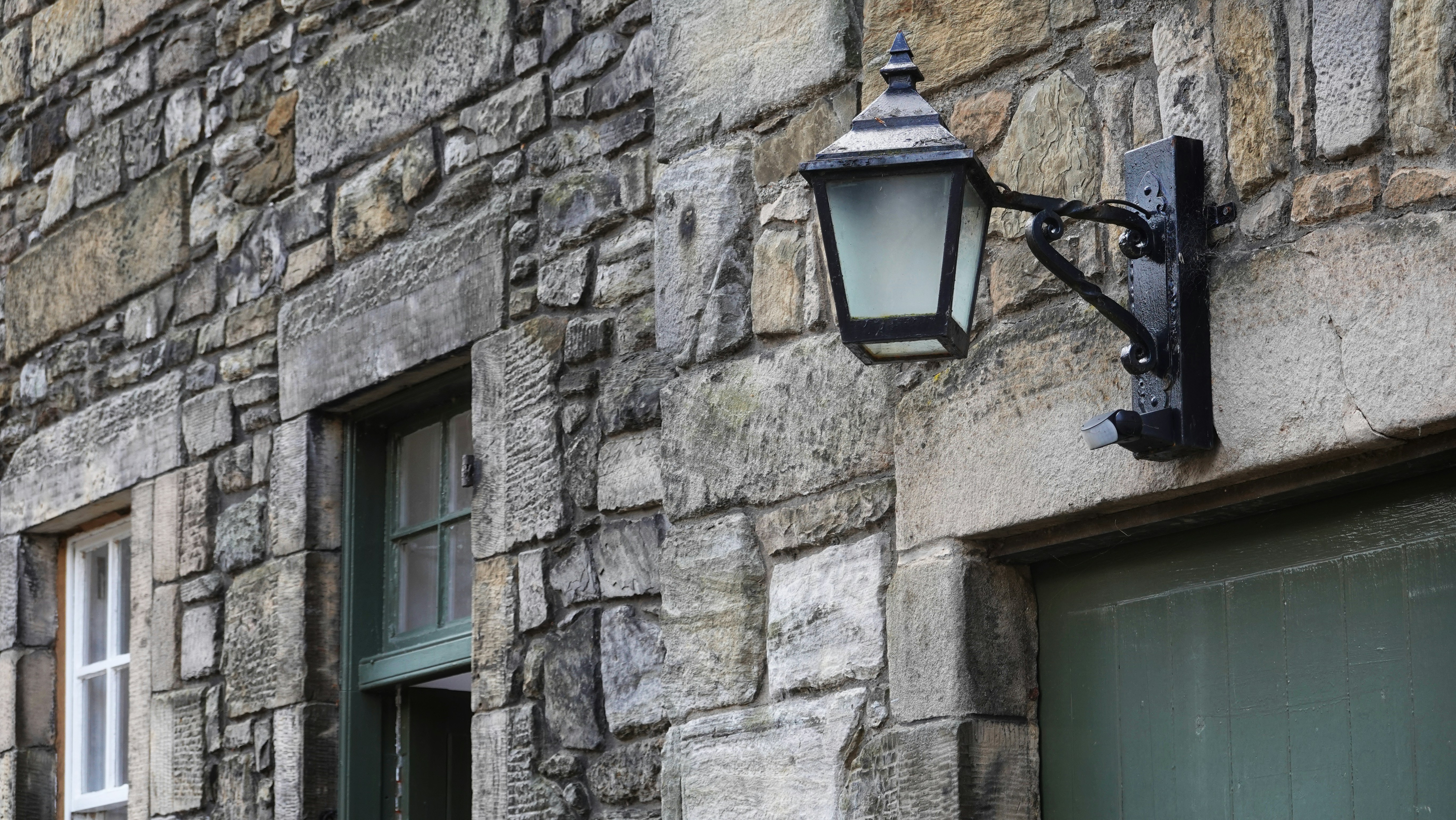 Old Stone Facade with Lantern