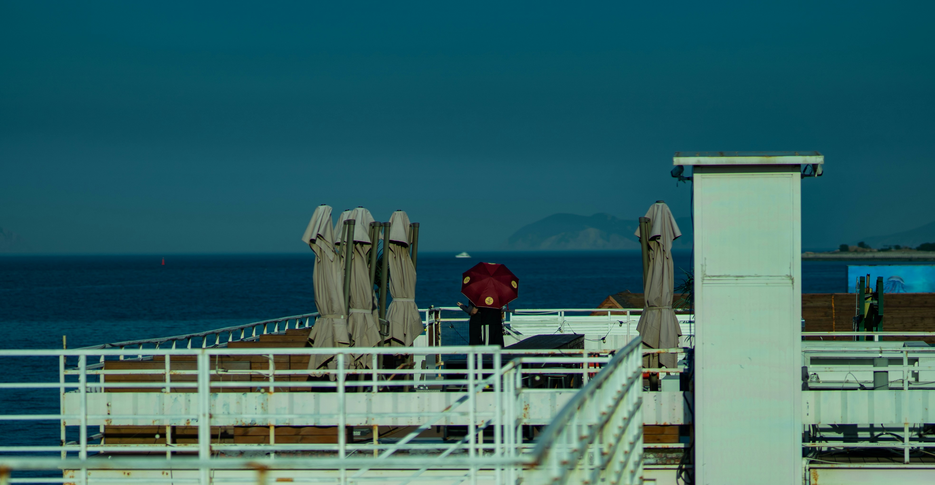 Umbrella Stand at the Quiet Pier