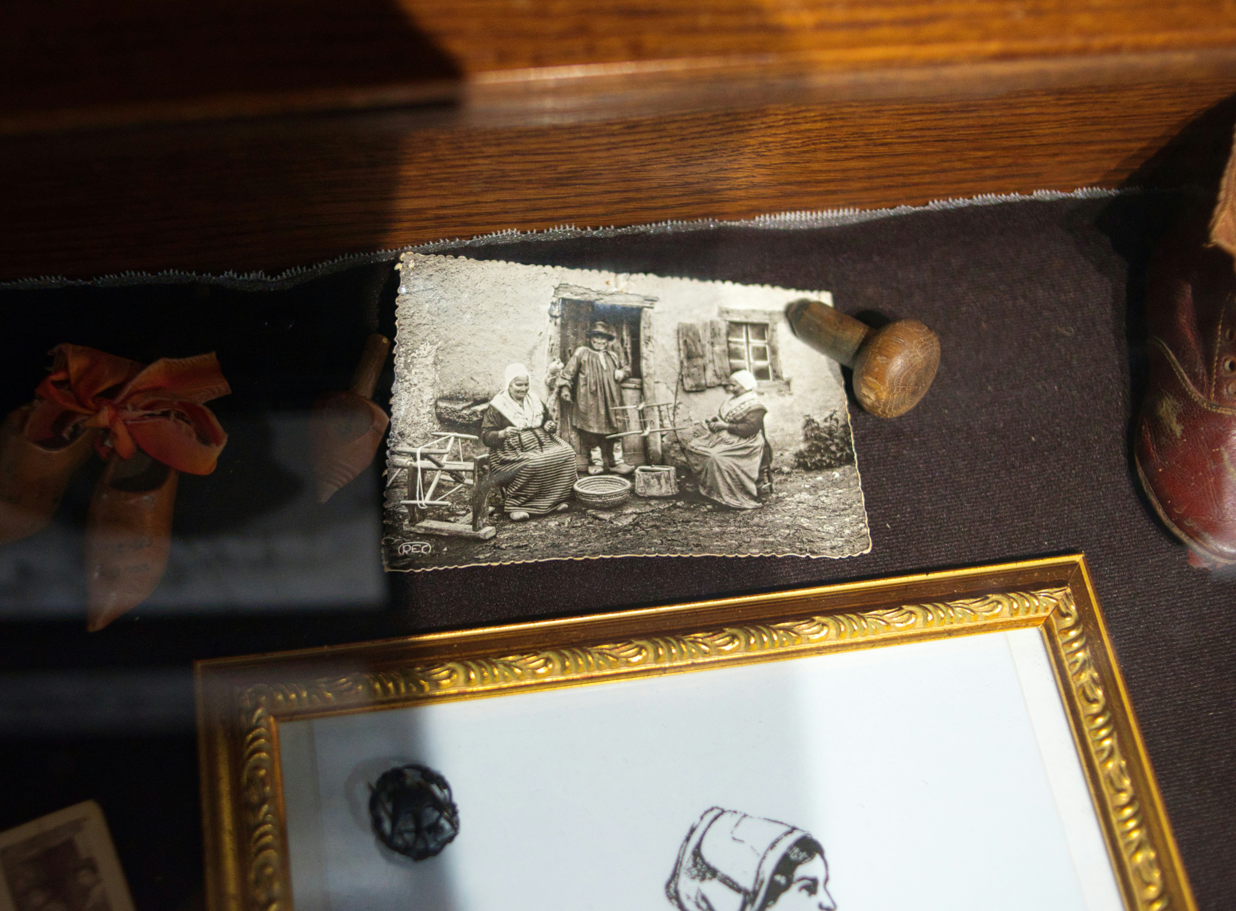 Vintage Keepsakes on a Glass Display Highlight