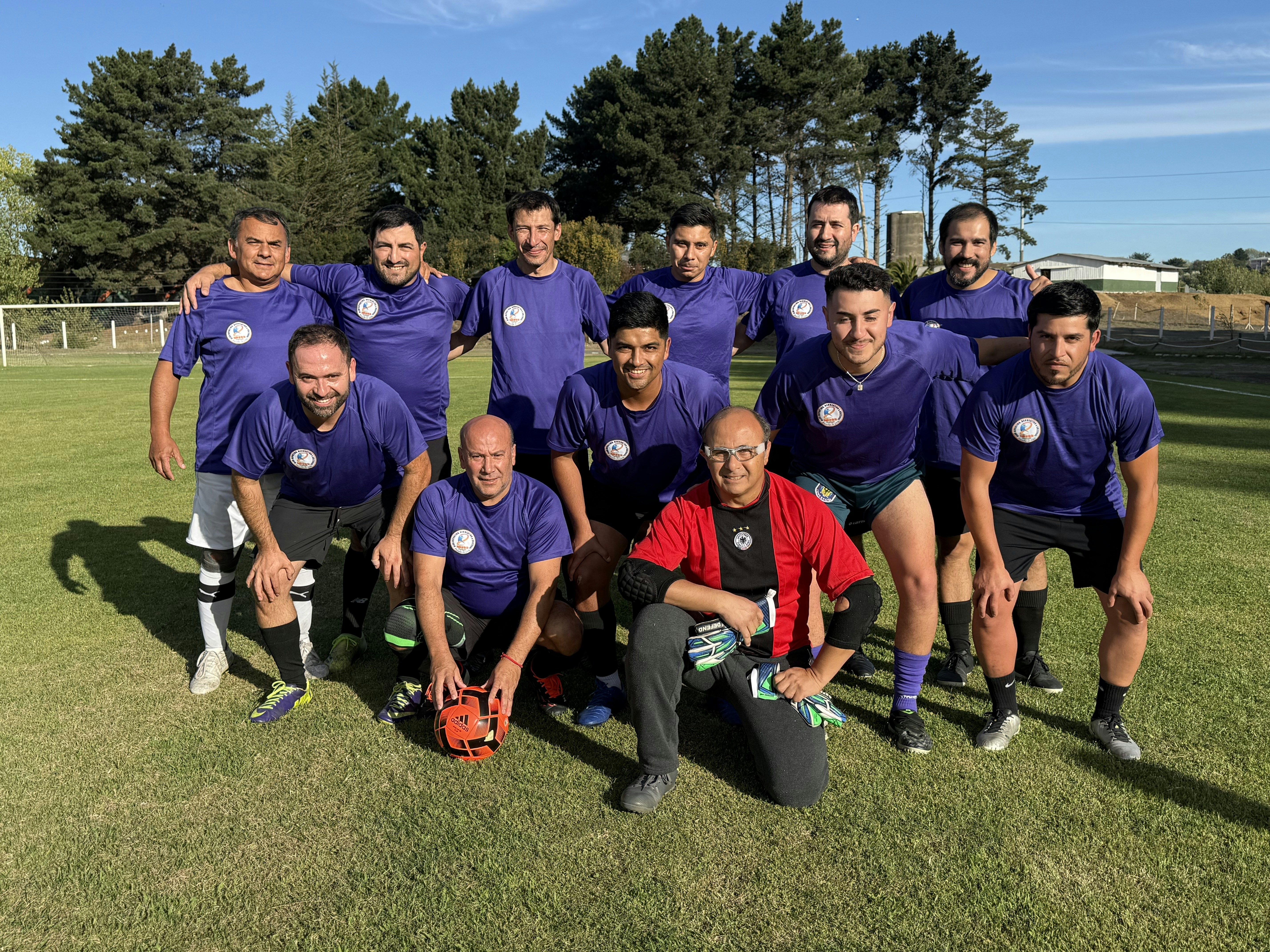 Team in Purple Forge Ahead on the Field