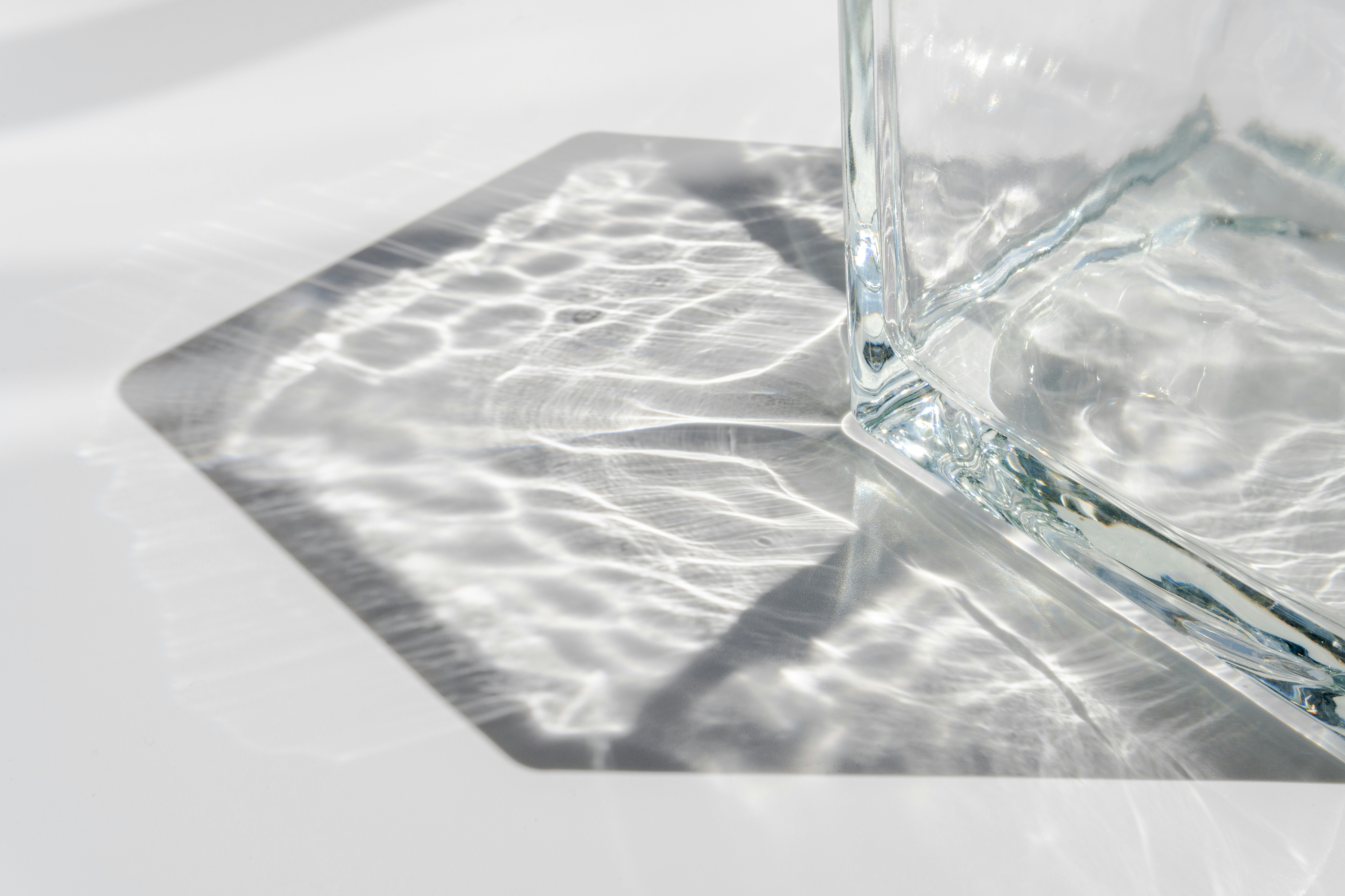 Prismatic Shadow: Light Dancing on a Glass Prism