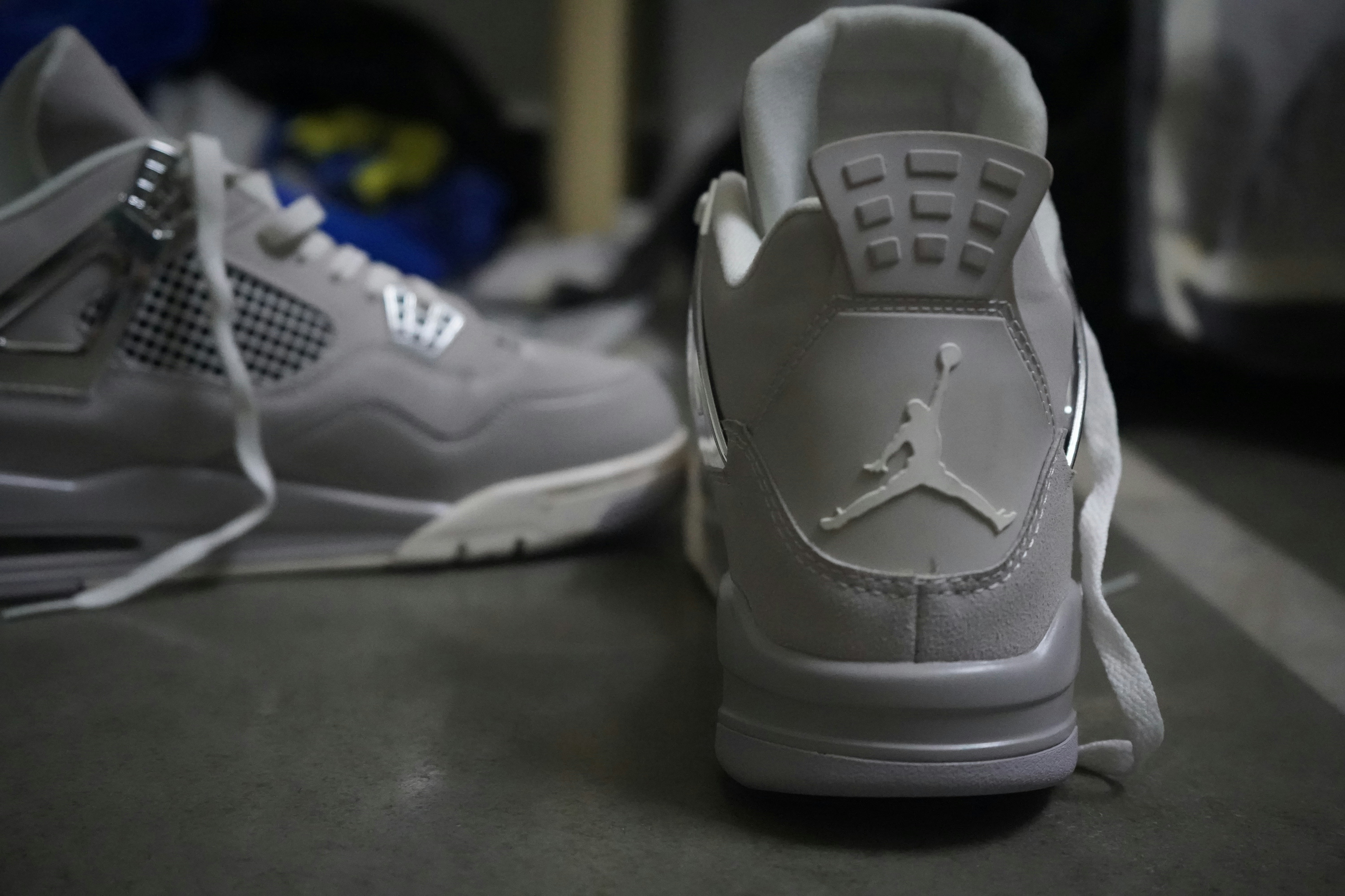 Rear View of a Jumpman-topped Sneaker Pair in a Dim Room