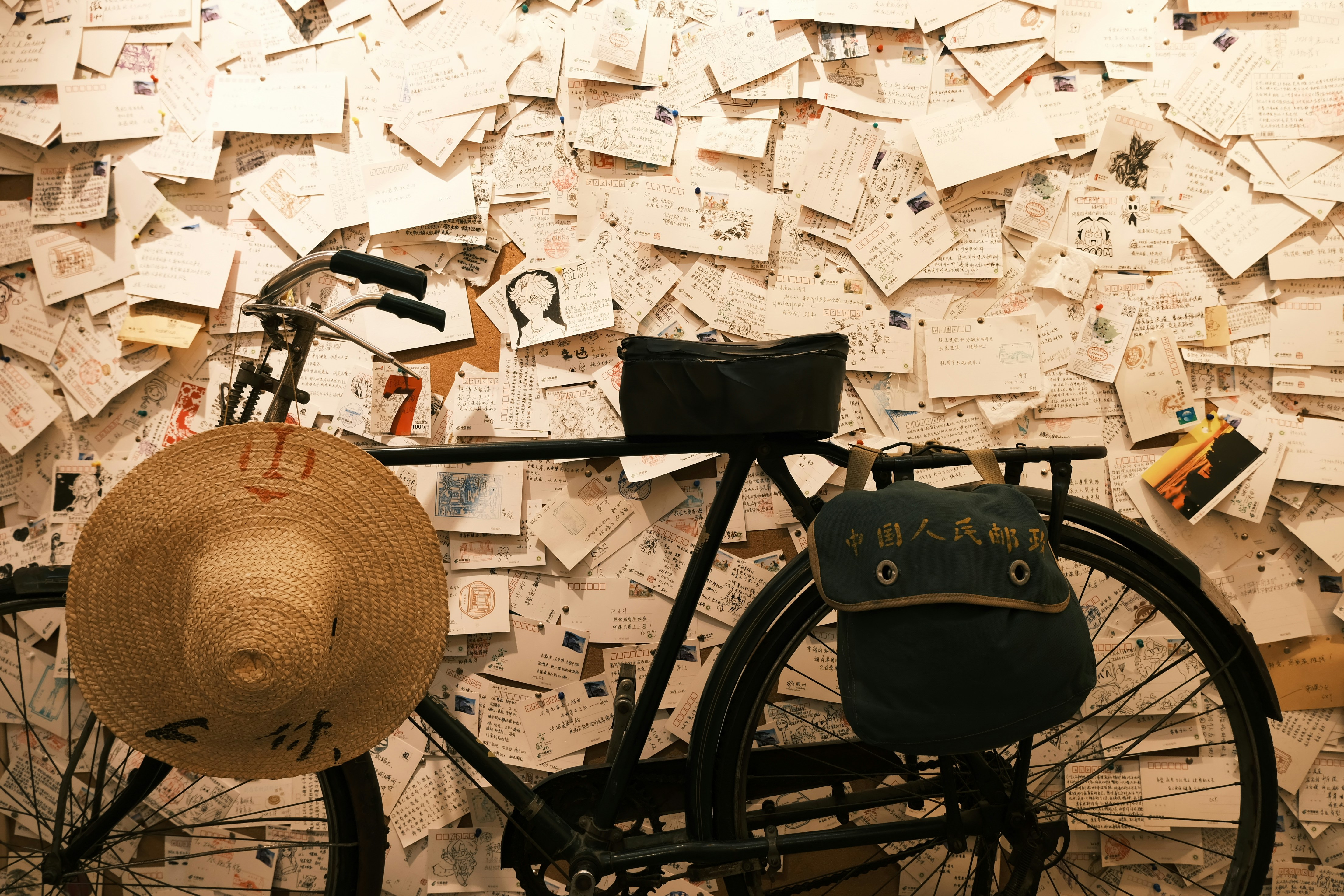 Bike Against a Wall of Notes: A Quiet Museum of Messages