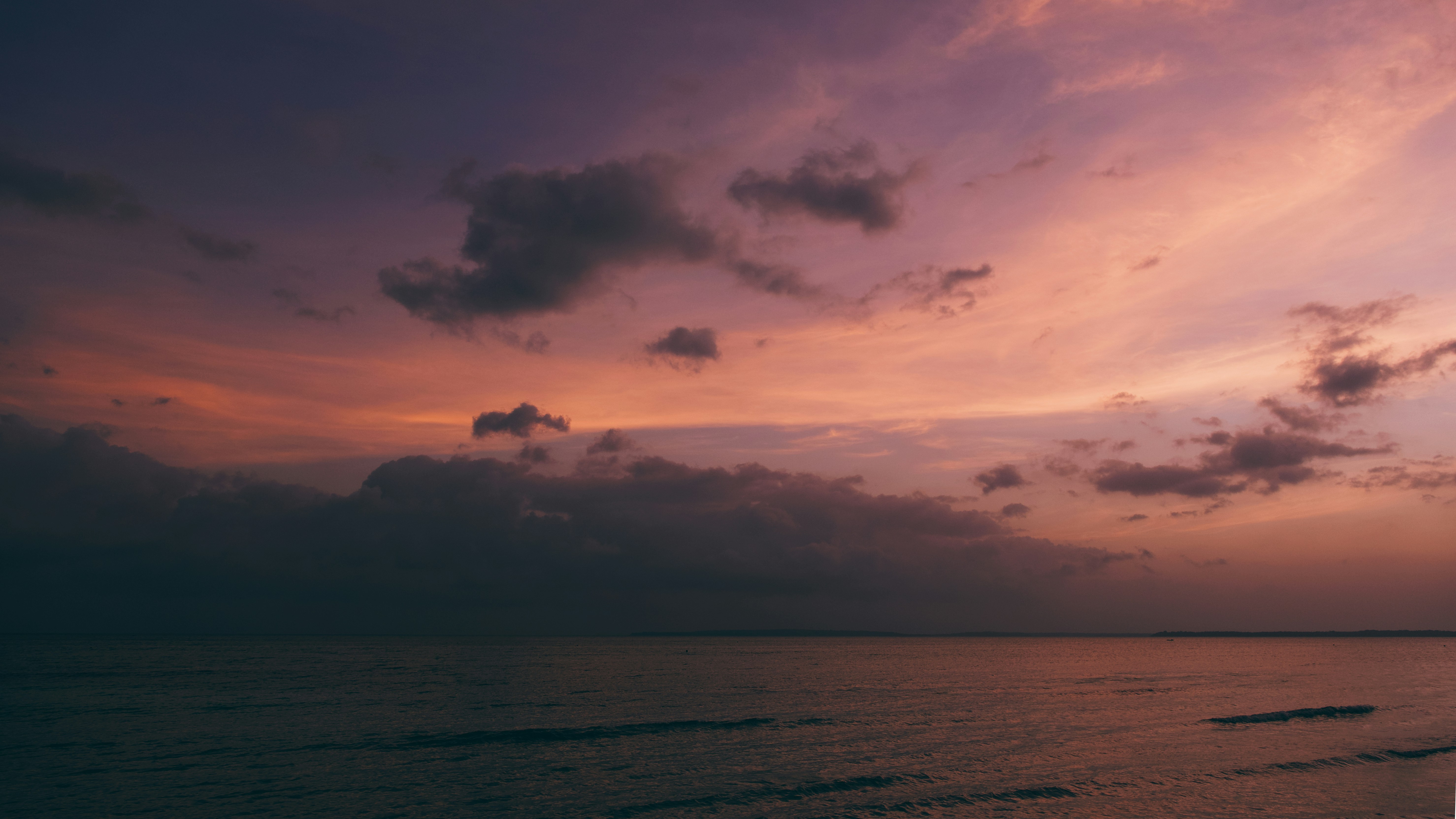 Azure Horizon: Sunset Composure Over Quiet Seas
