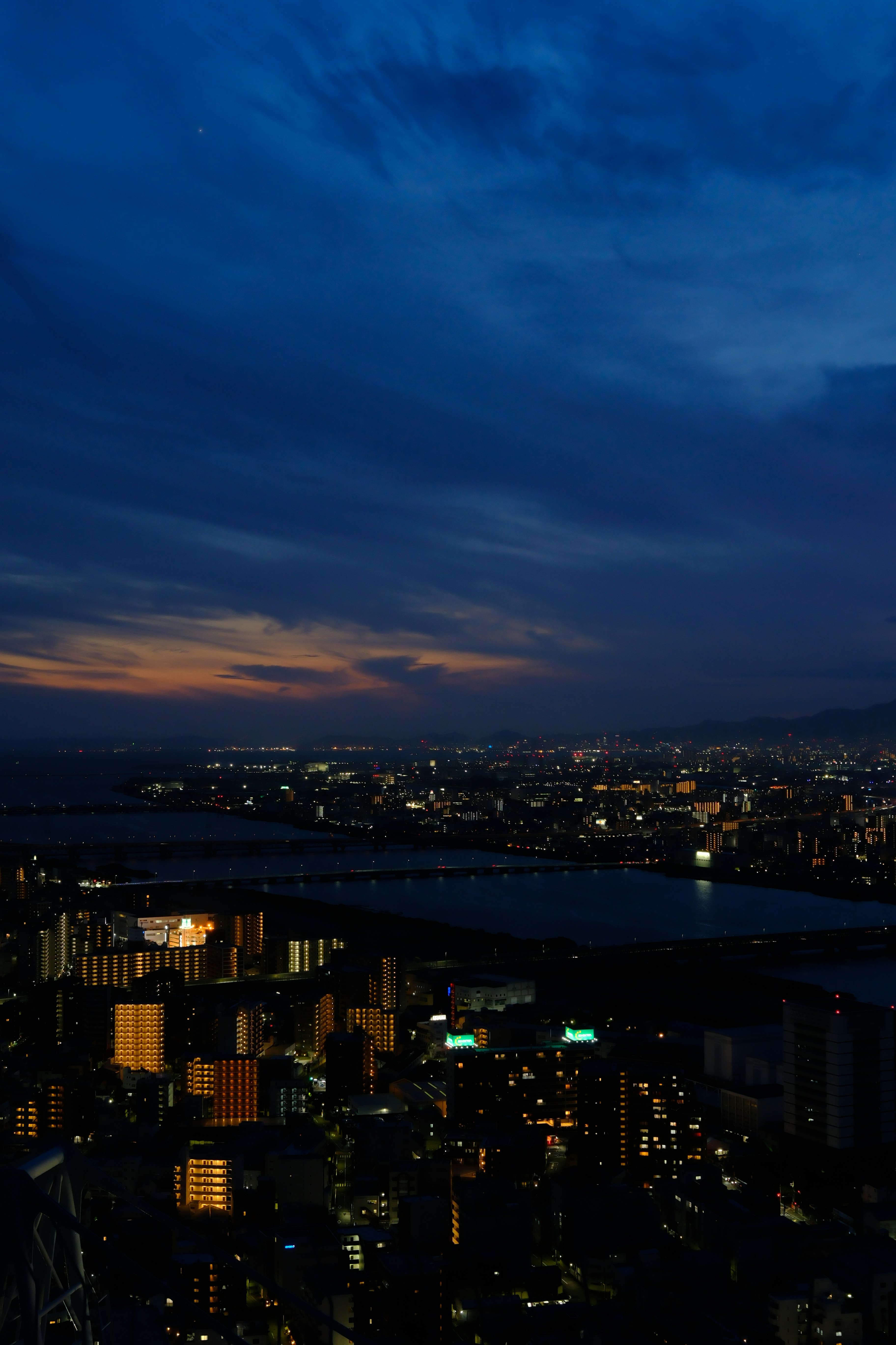 Twilight City Umbra: A Quiet Fleet of Lights Across the Bay