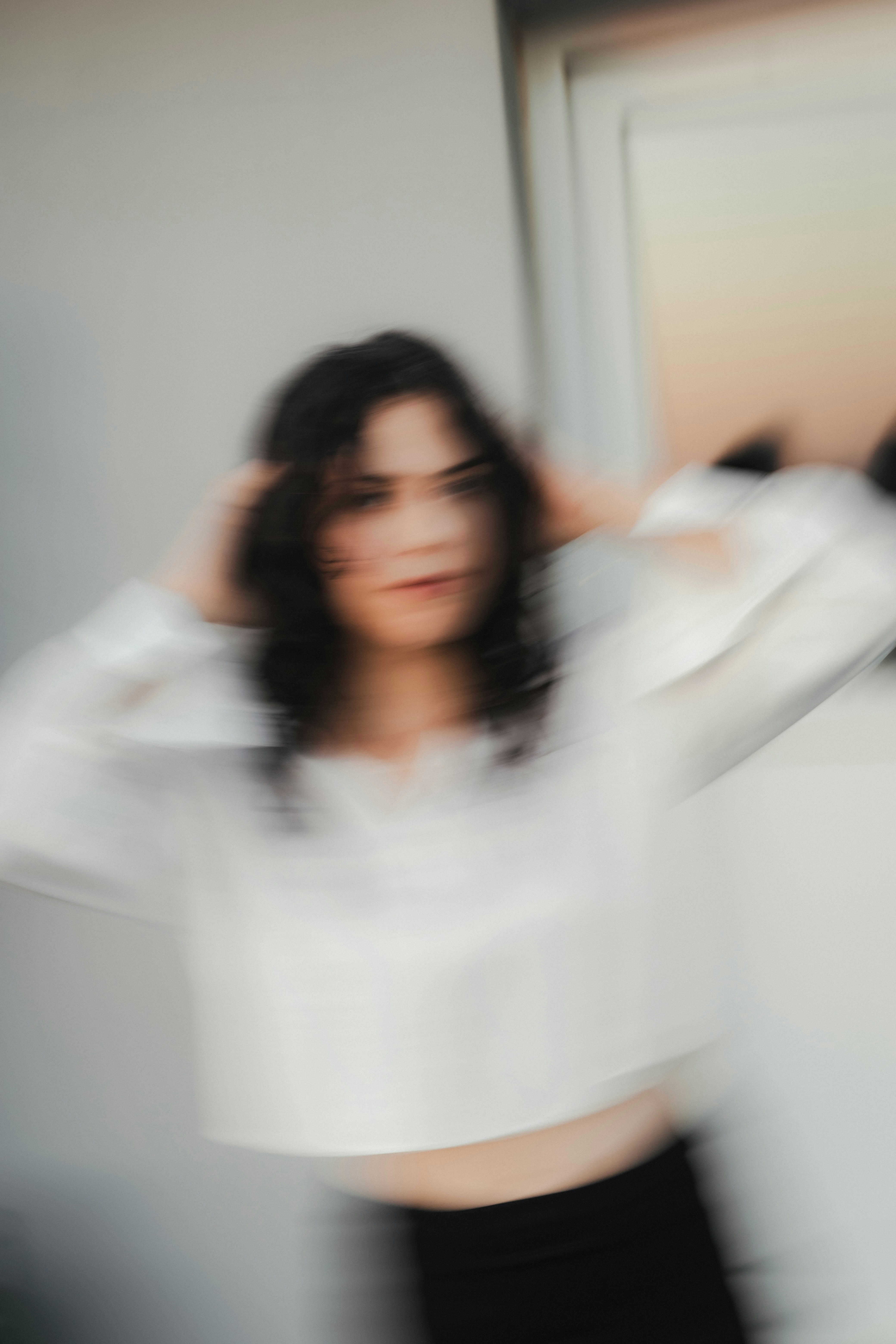 Blurred Neon Pose: A Soft-Focused Portrait in Motion