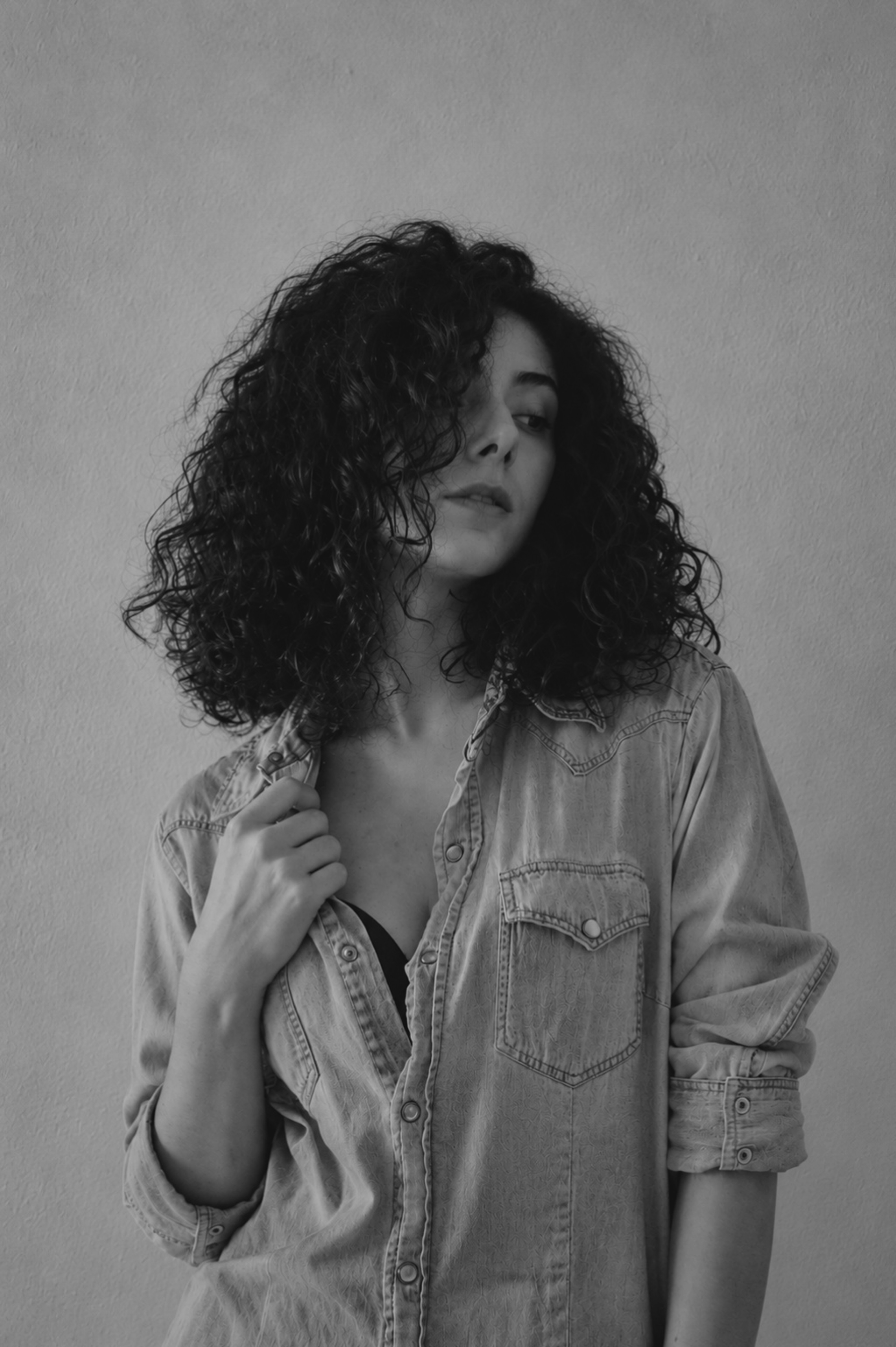 Curled Noir: A Portrait in Quiet Gravity