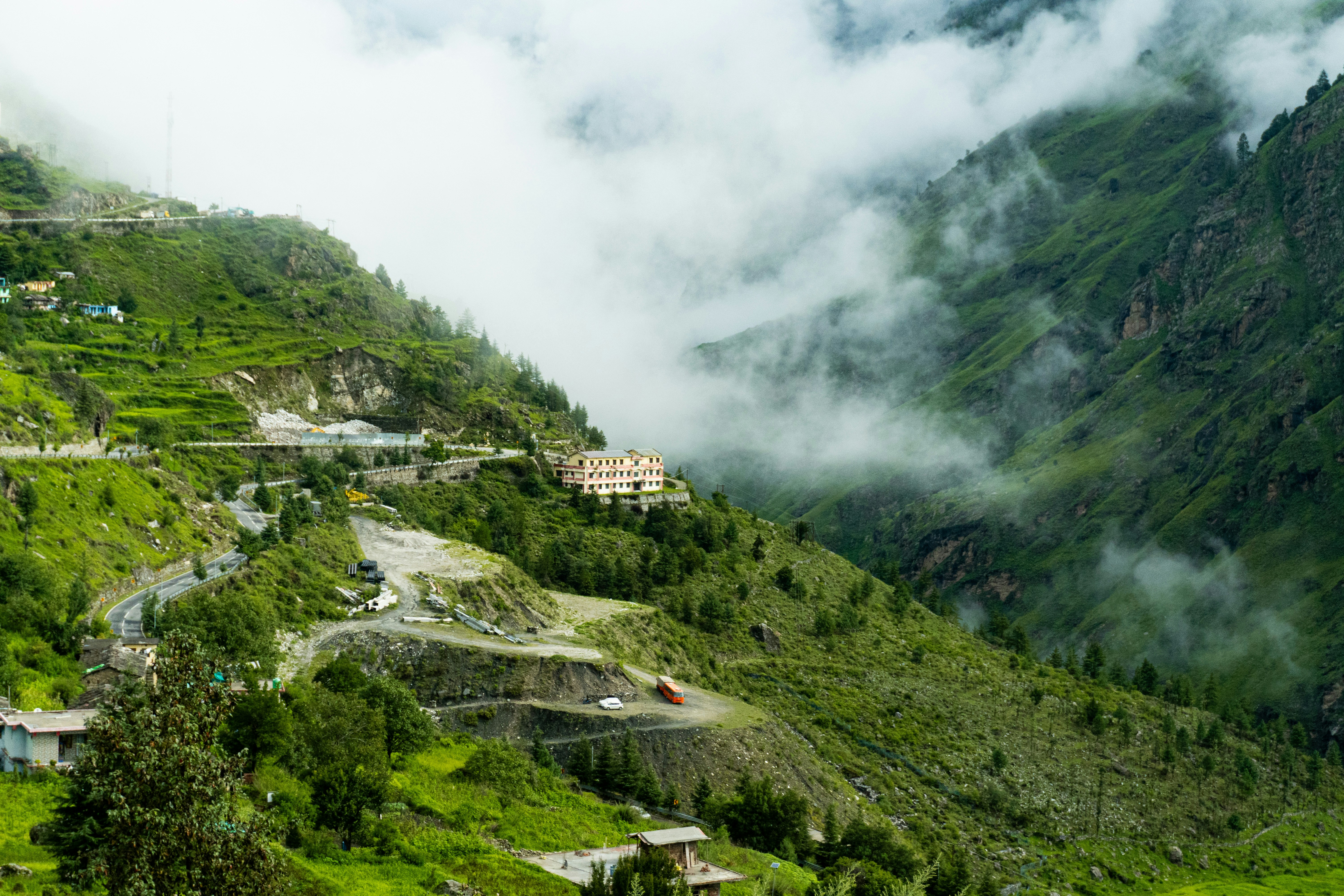 Terraced Village Clinging to the Mist-Scarred Cliffs
