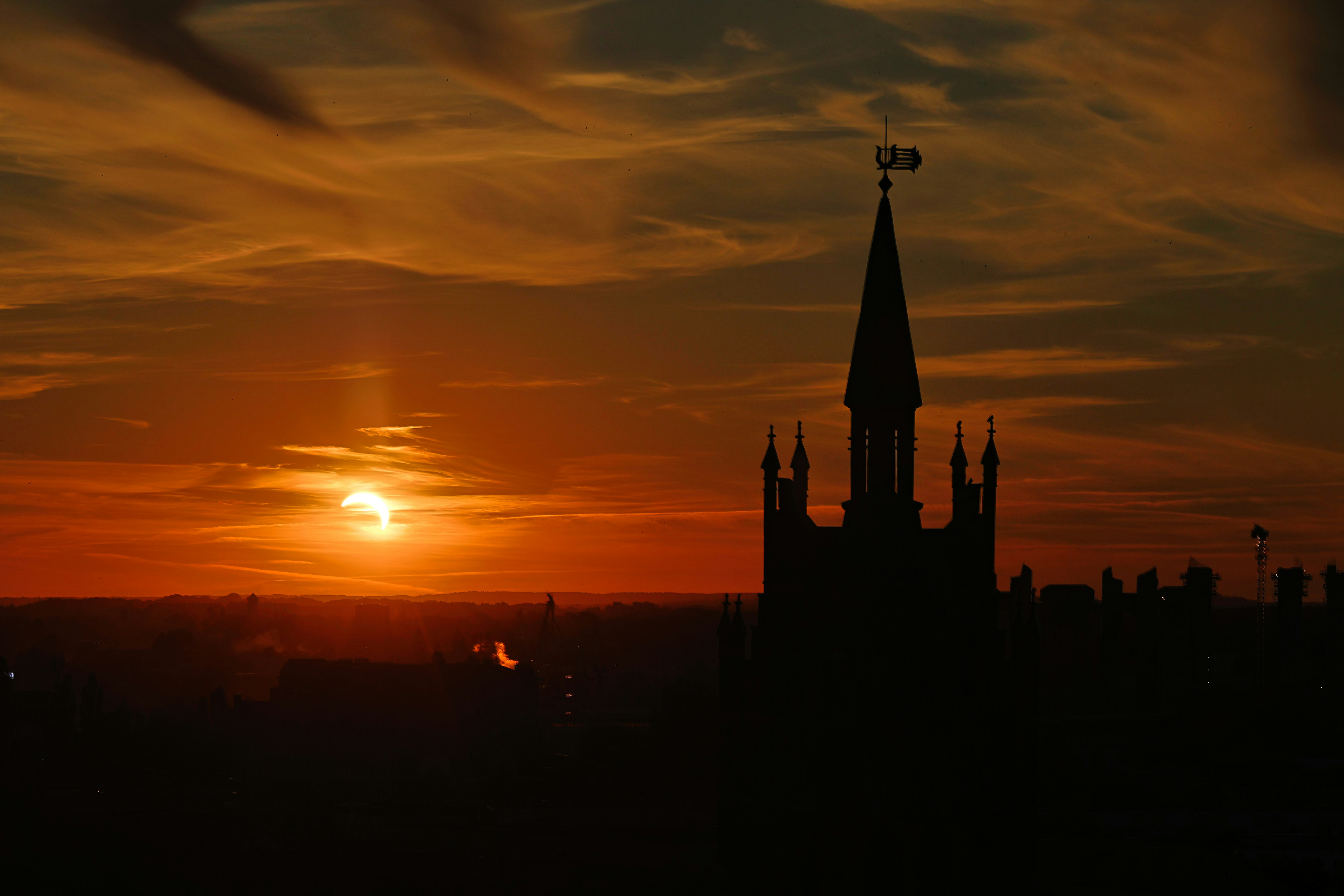 Sunset Sentinel: The City in Shadow and Flame