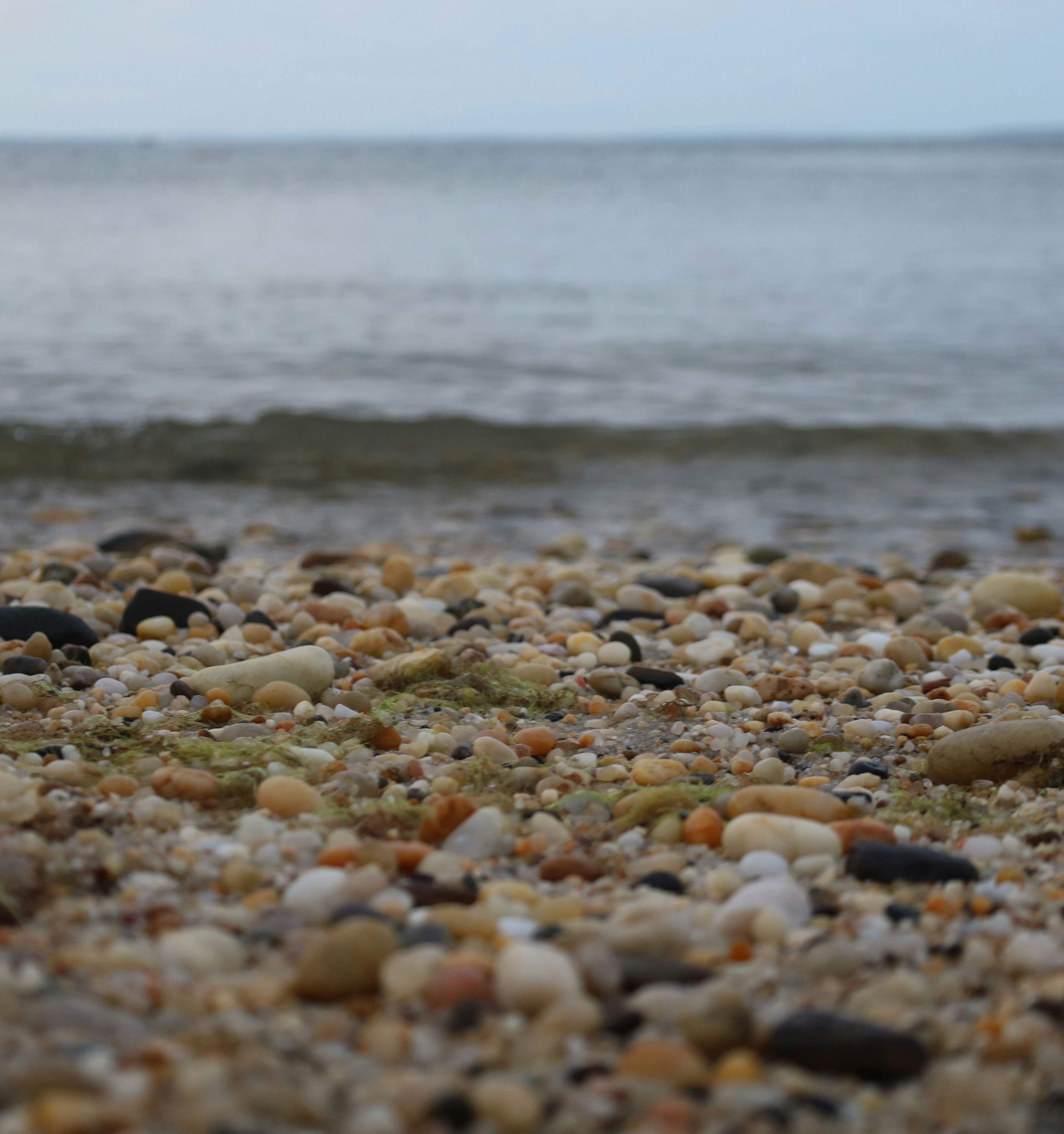 Pebble Shoreline: A Quiet Confluence of Sand and Sea