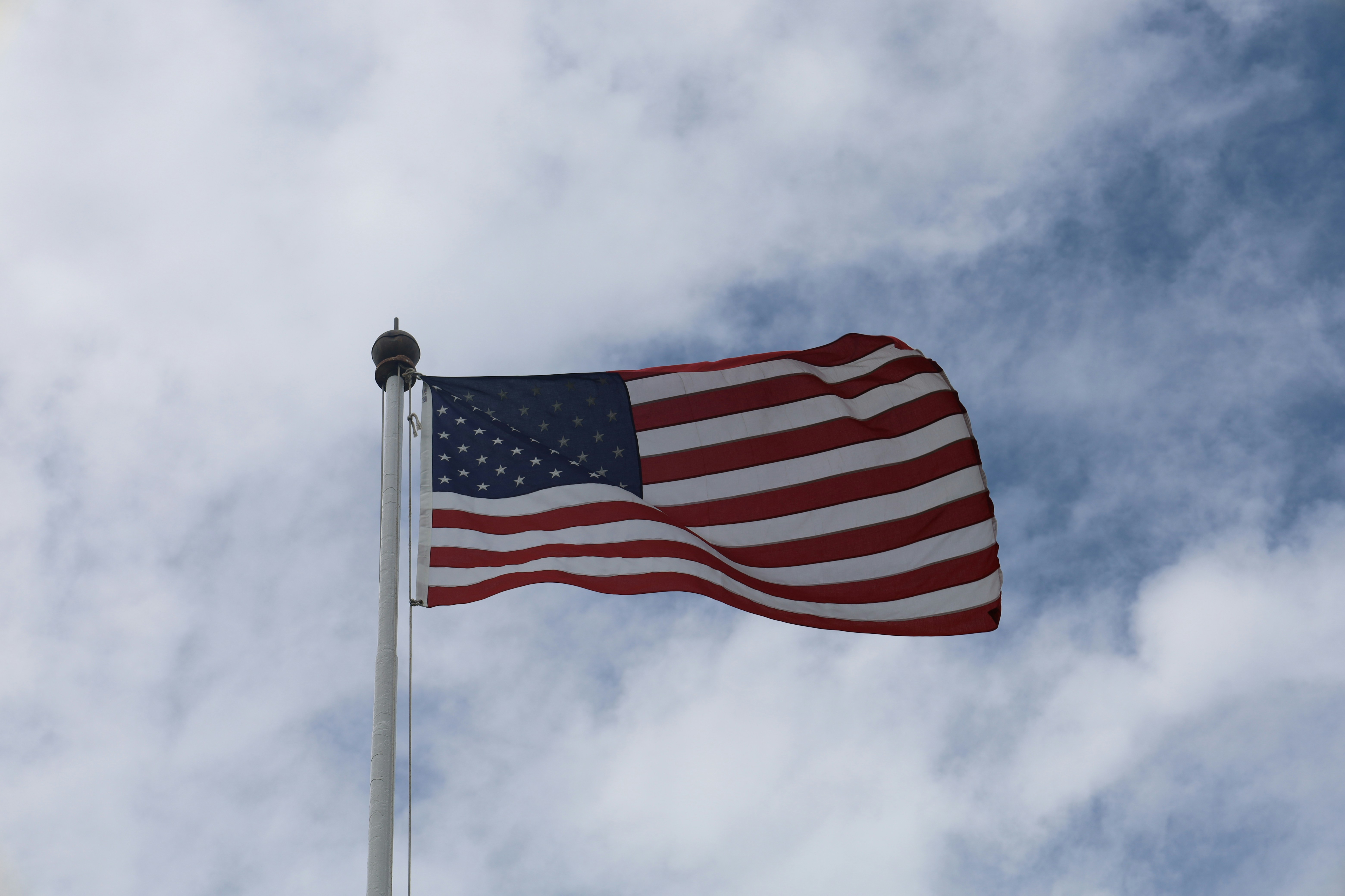 Flag Wavelength: An American Flag Against a Windy Sky