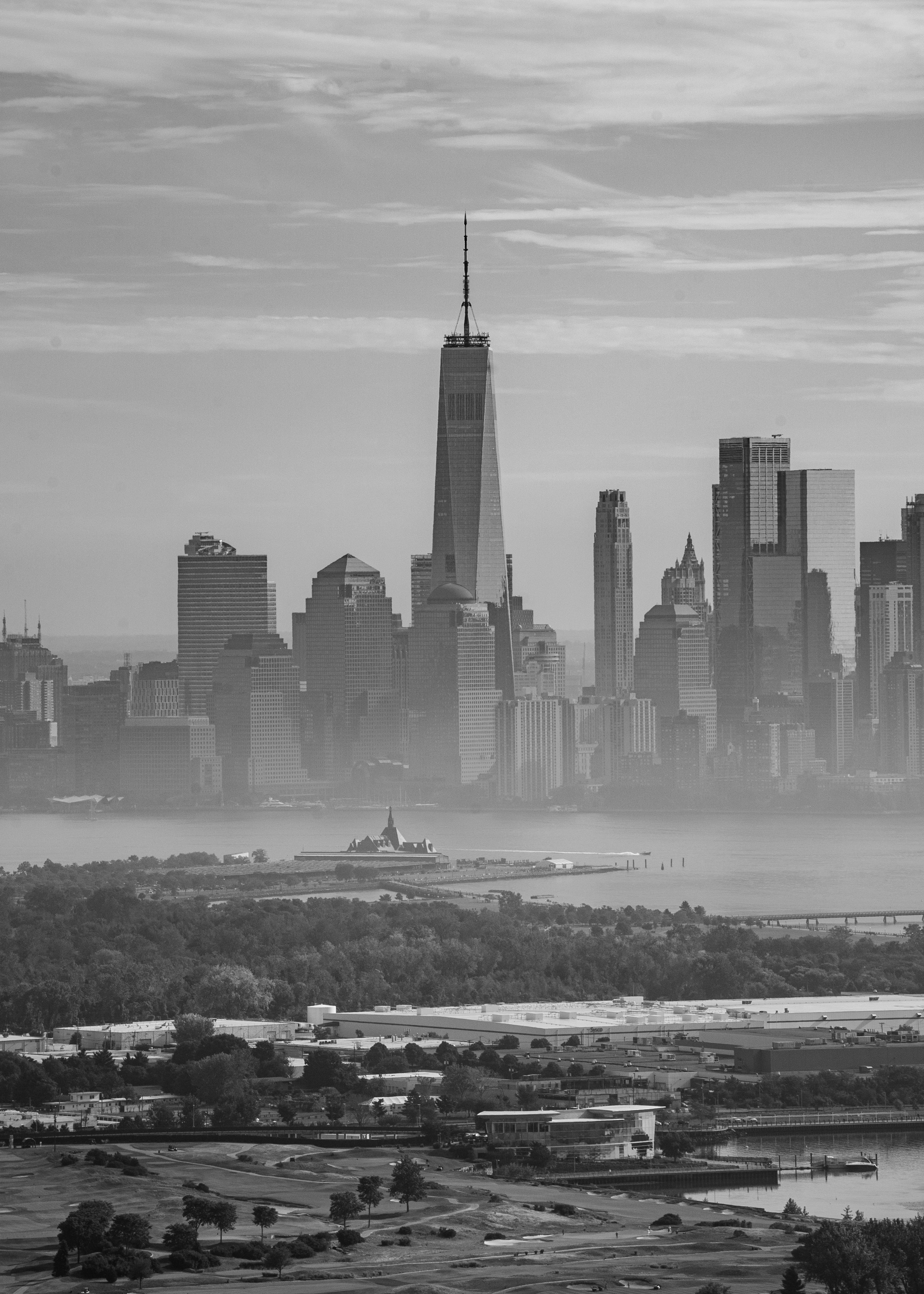 Veiled Skyline: Morning Mist over Manhattan