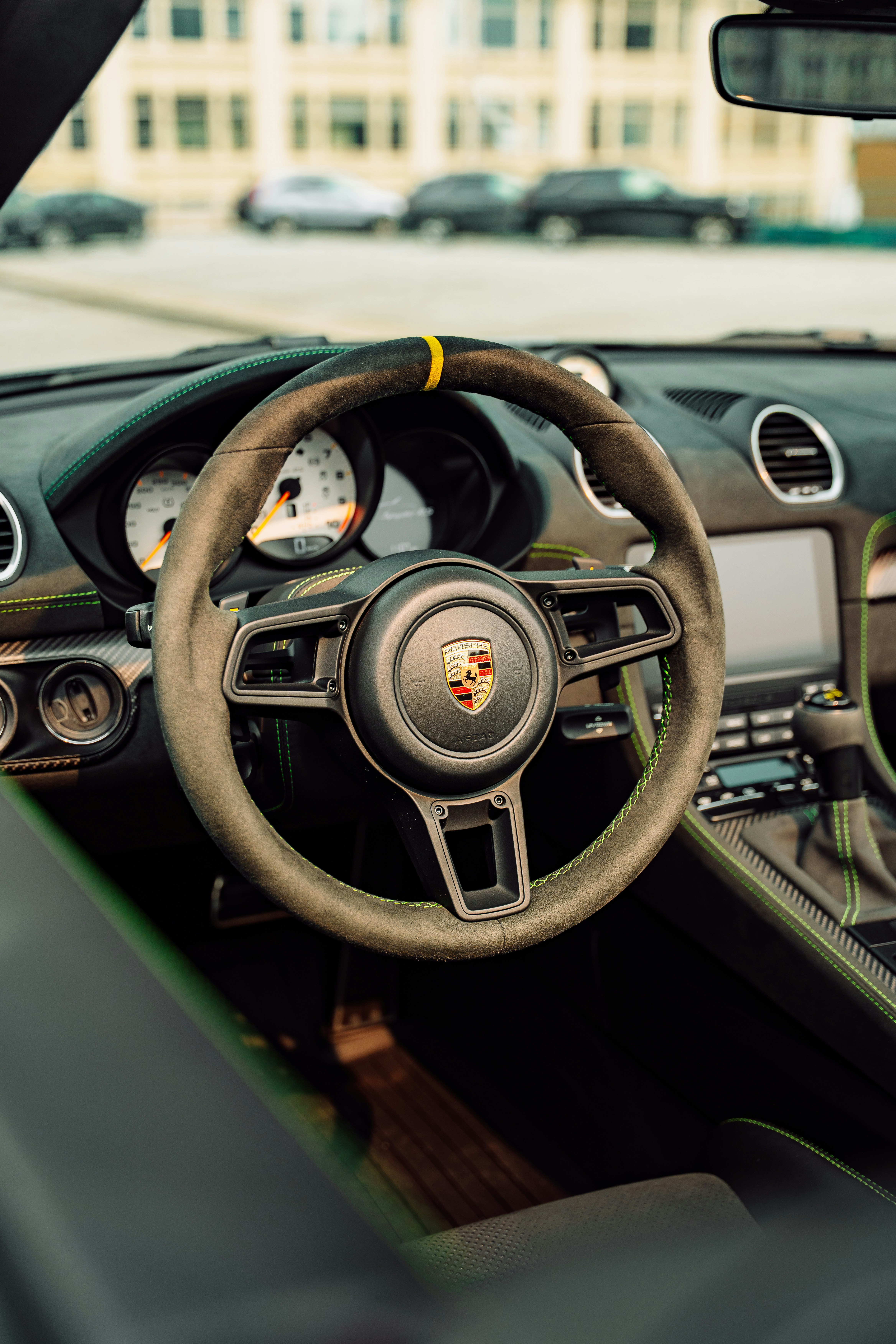 Steering Glory: Porsche cockpit with rich textures and green stitching