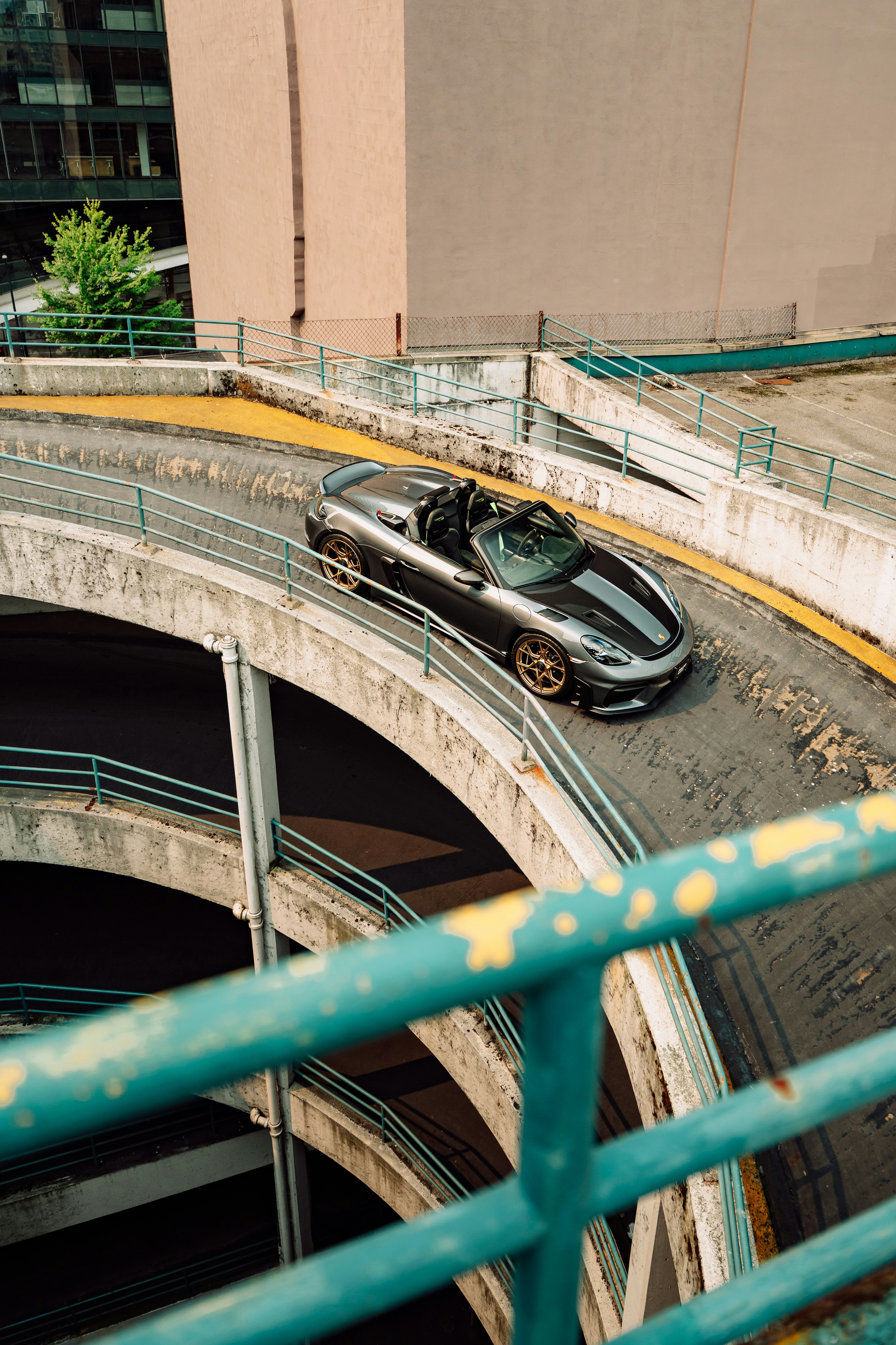 Clipped Curve: A Convertible Rides the Spiral of Parking