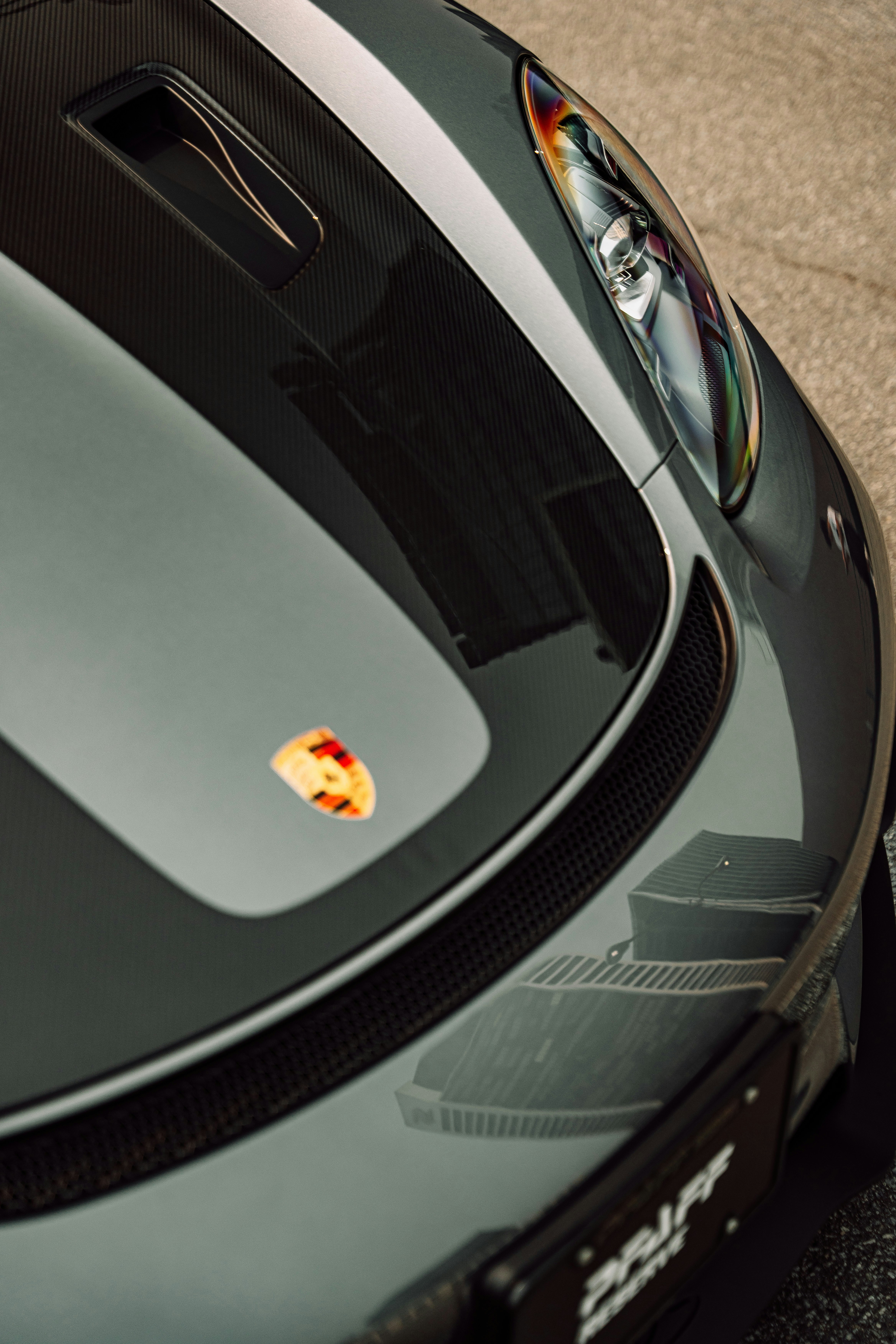 Curved Steel and Petal Light: A Porsche Front End in Focus