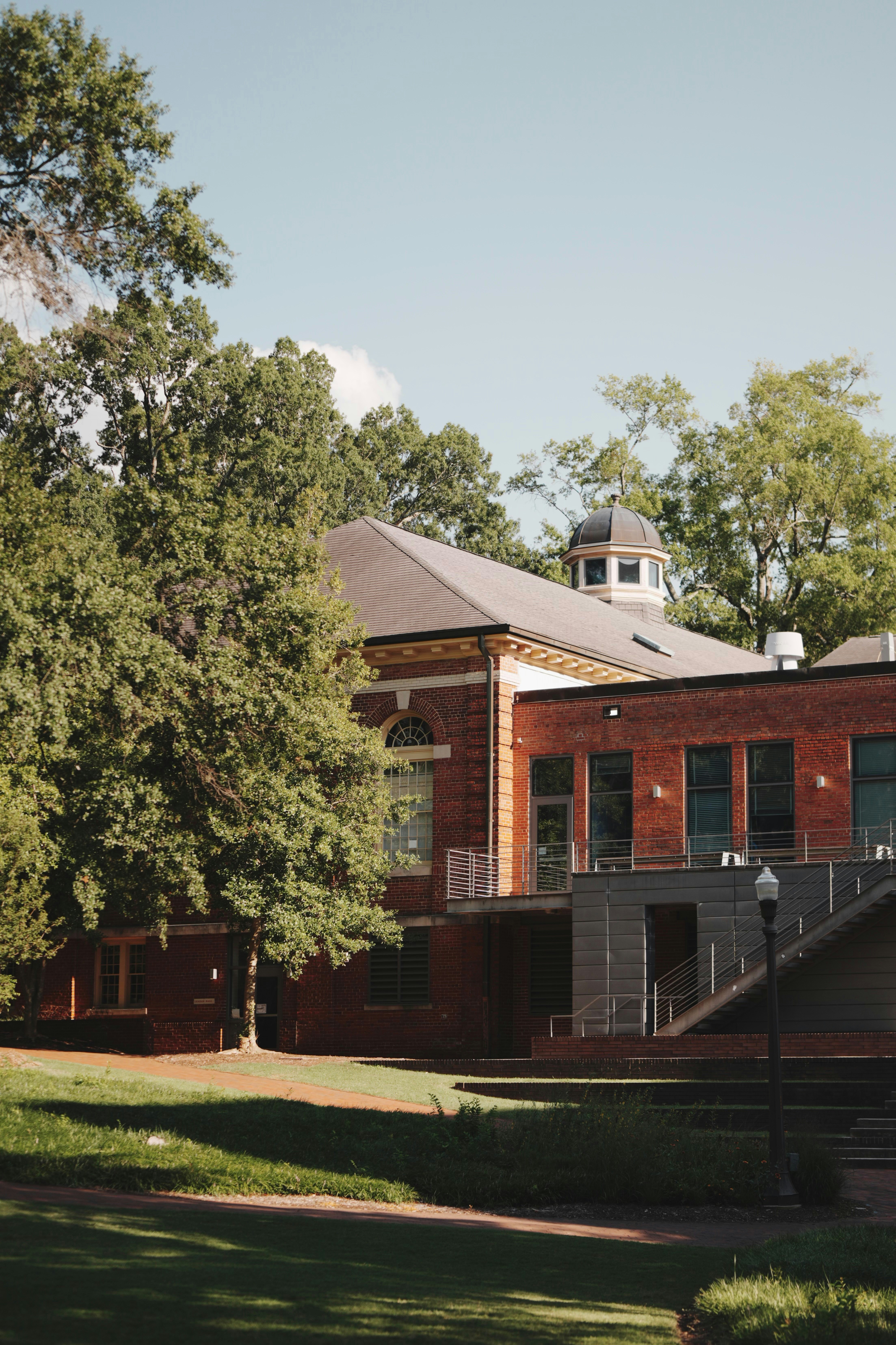 Brick Campus Hall Framed by Shadow and Light