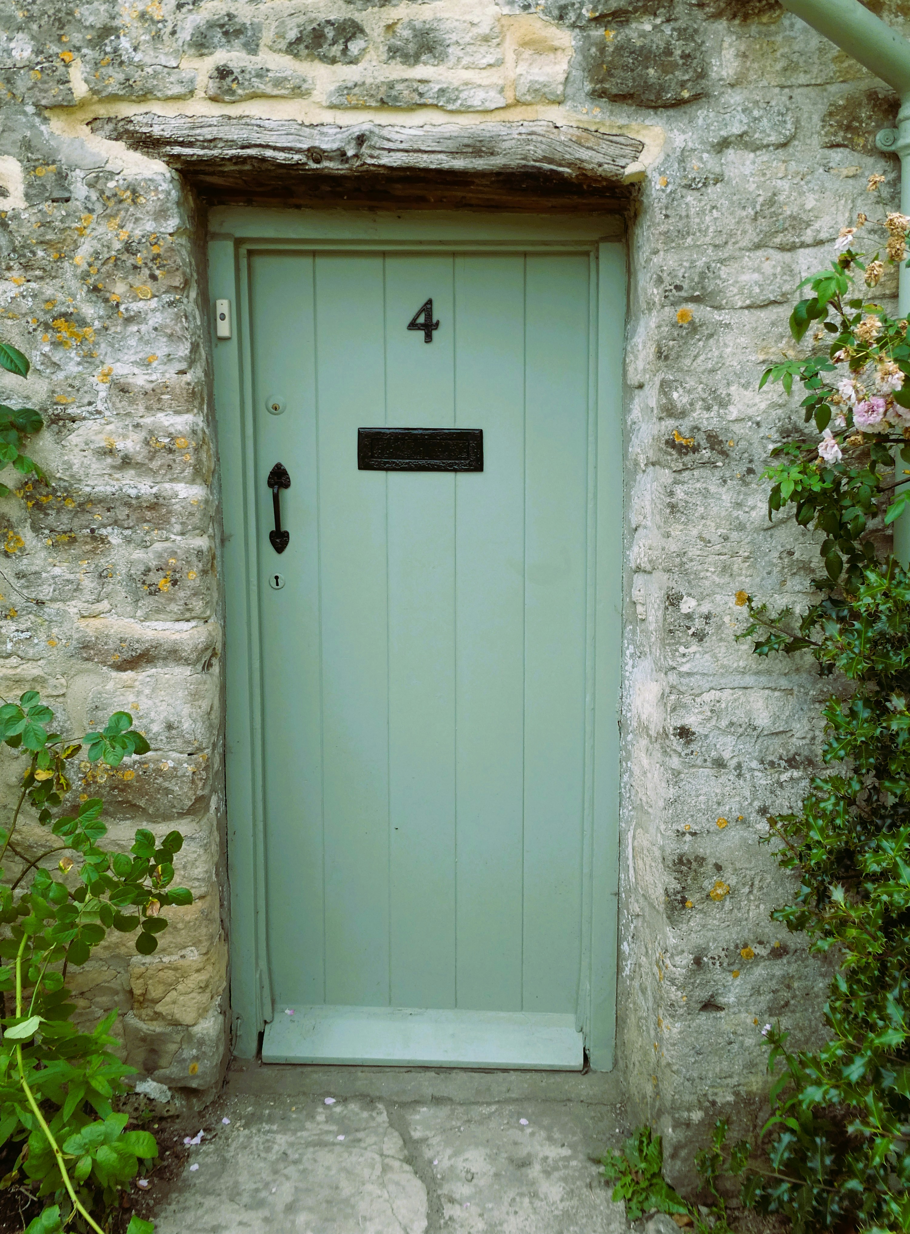 Pastel Doorway in a stone Cottage Wall