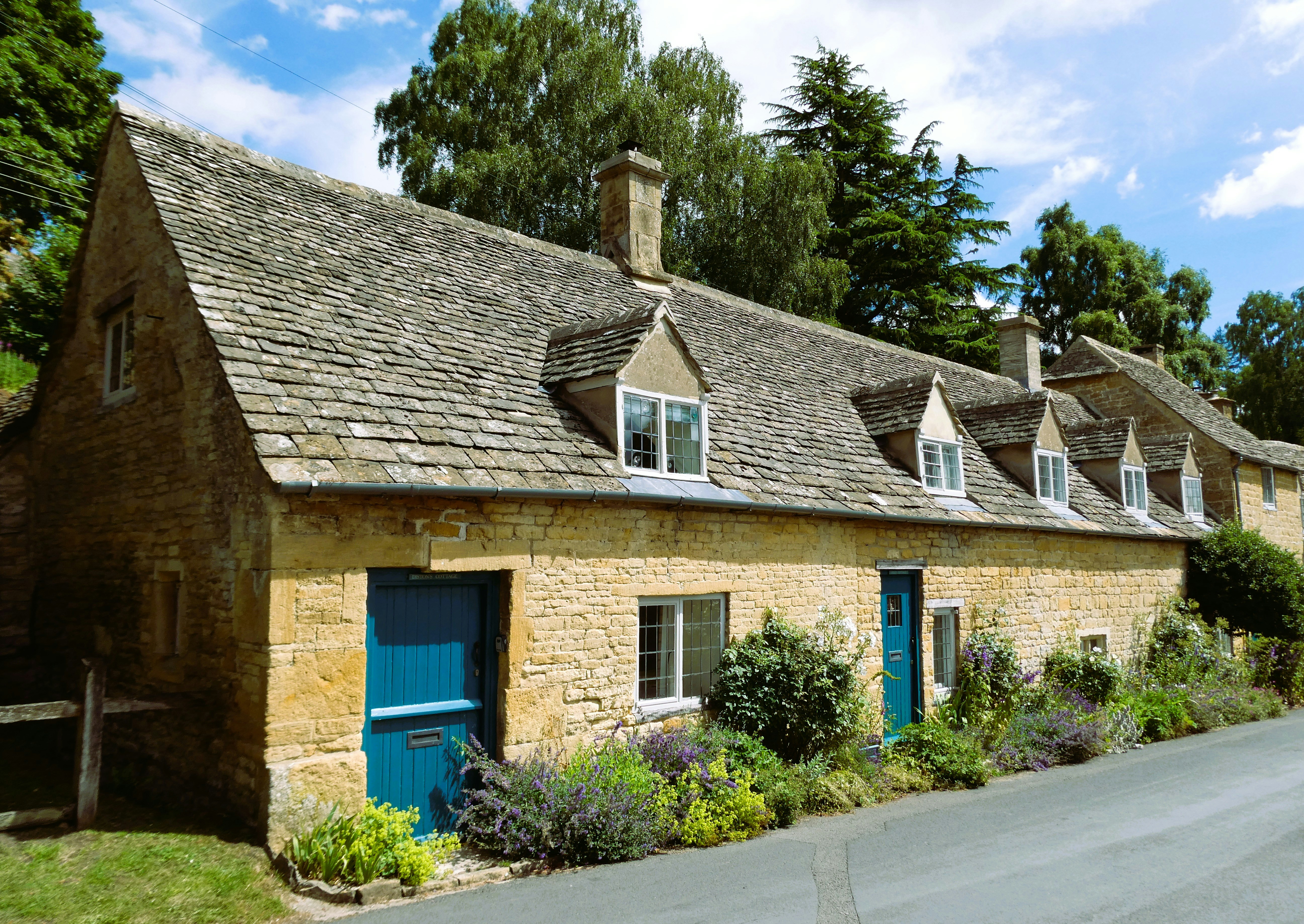 Cottage Row in Sunlit Heritage Lane
