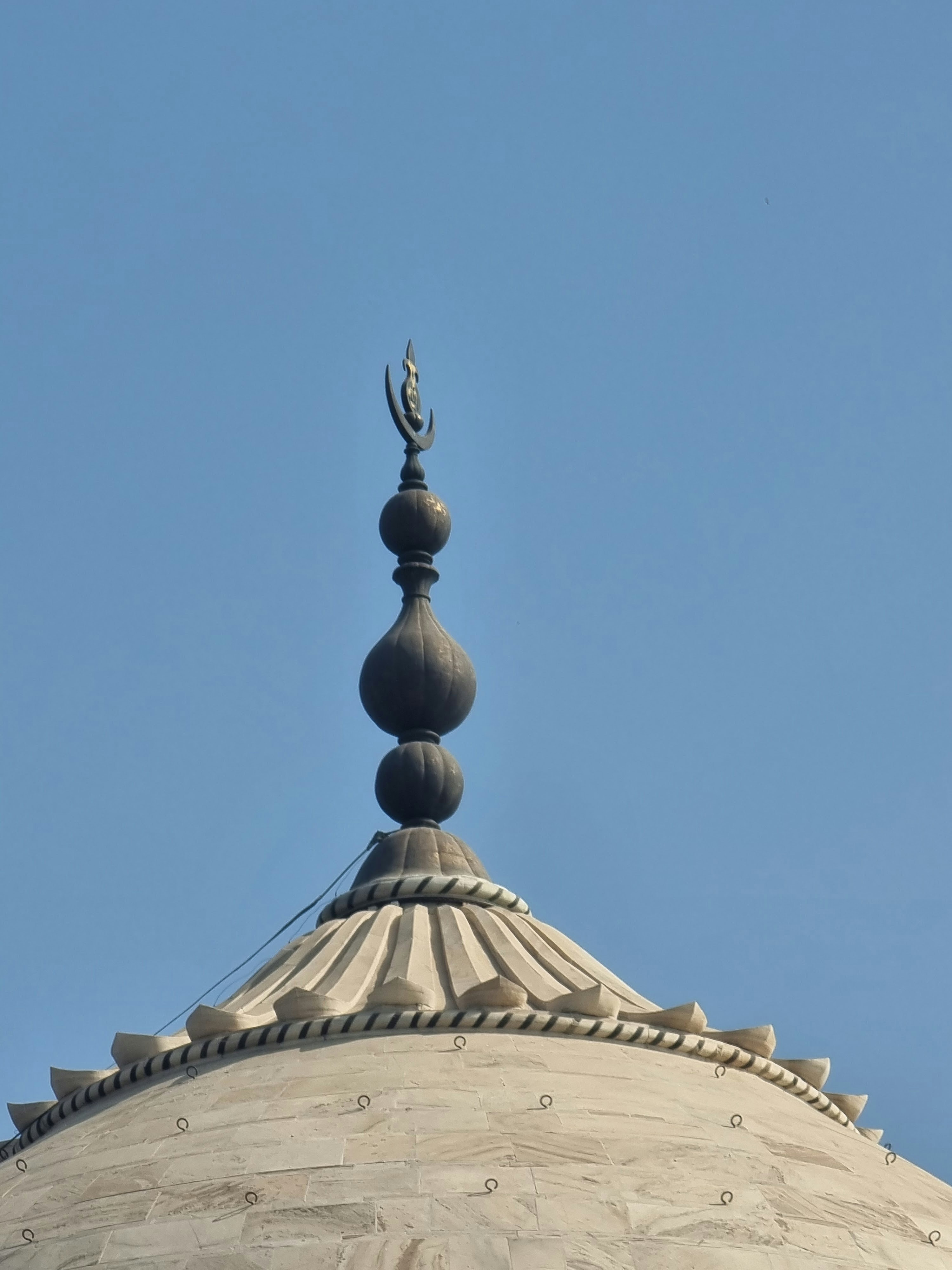 Temple Finial Against a Clear Sky