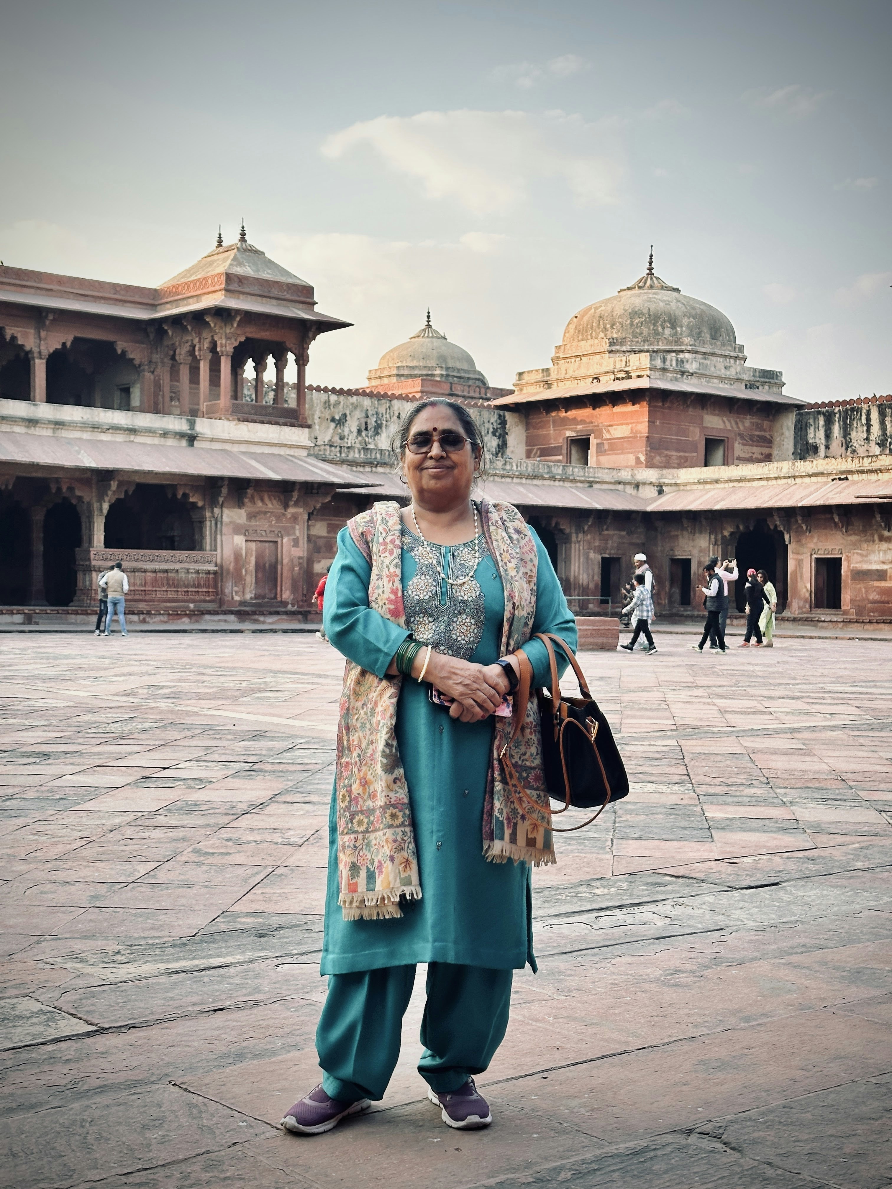 Courtyard Portrait Under Historic Domes