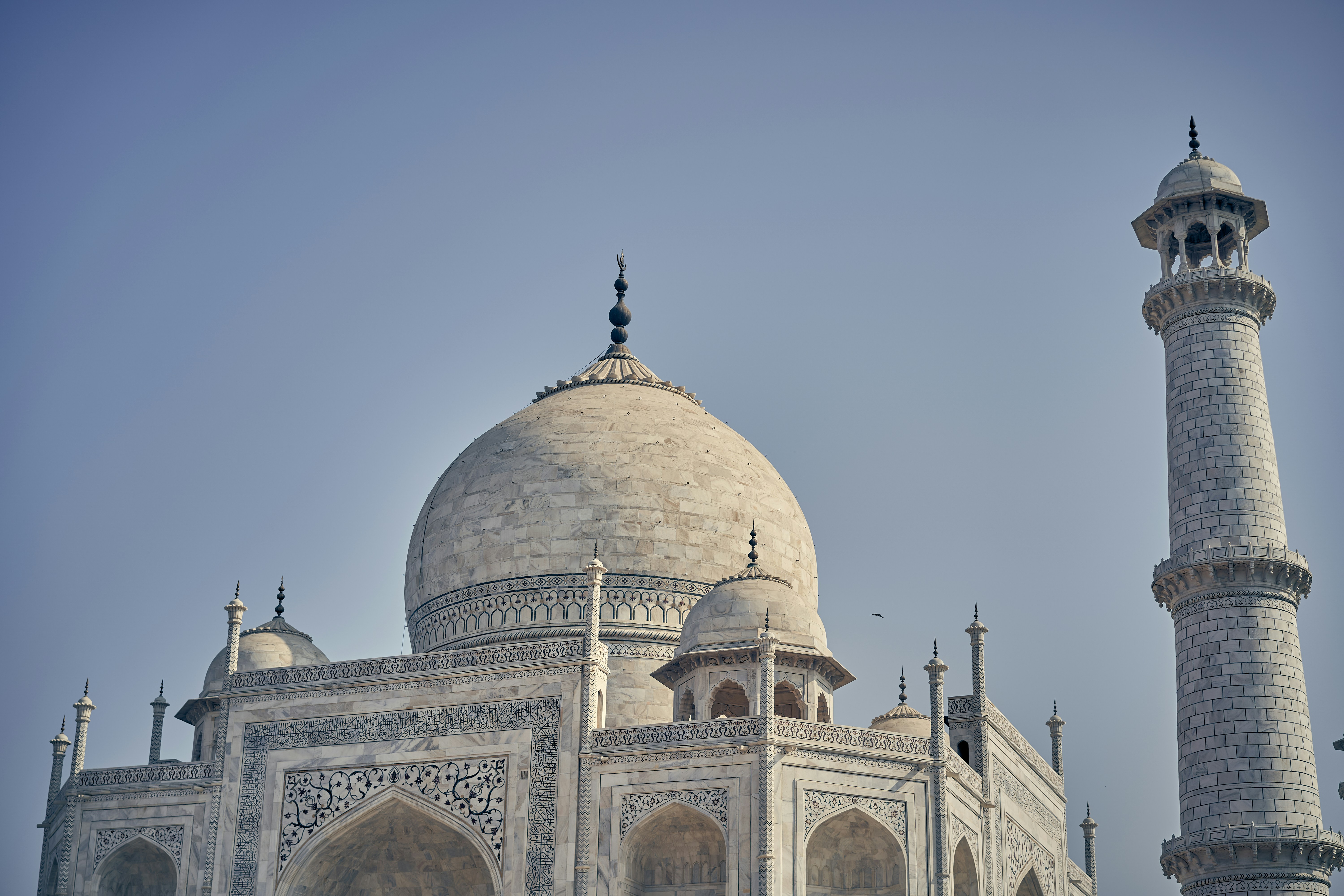 Dome and Minaret: A Quiet Symphony of Marble Against a Clear Sky