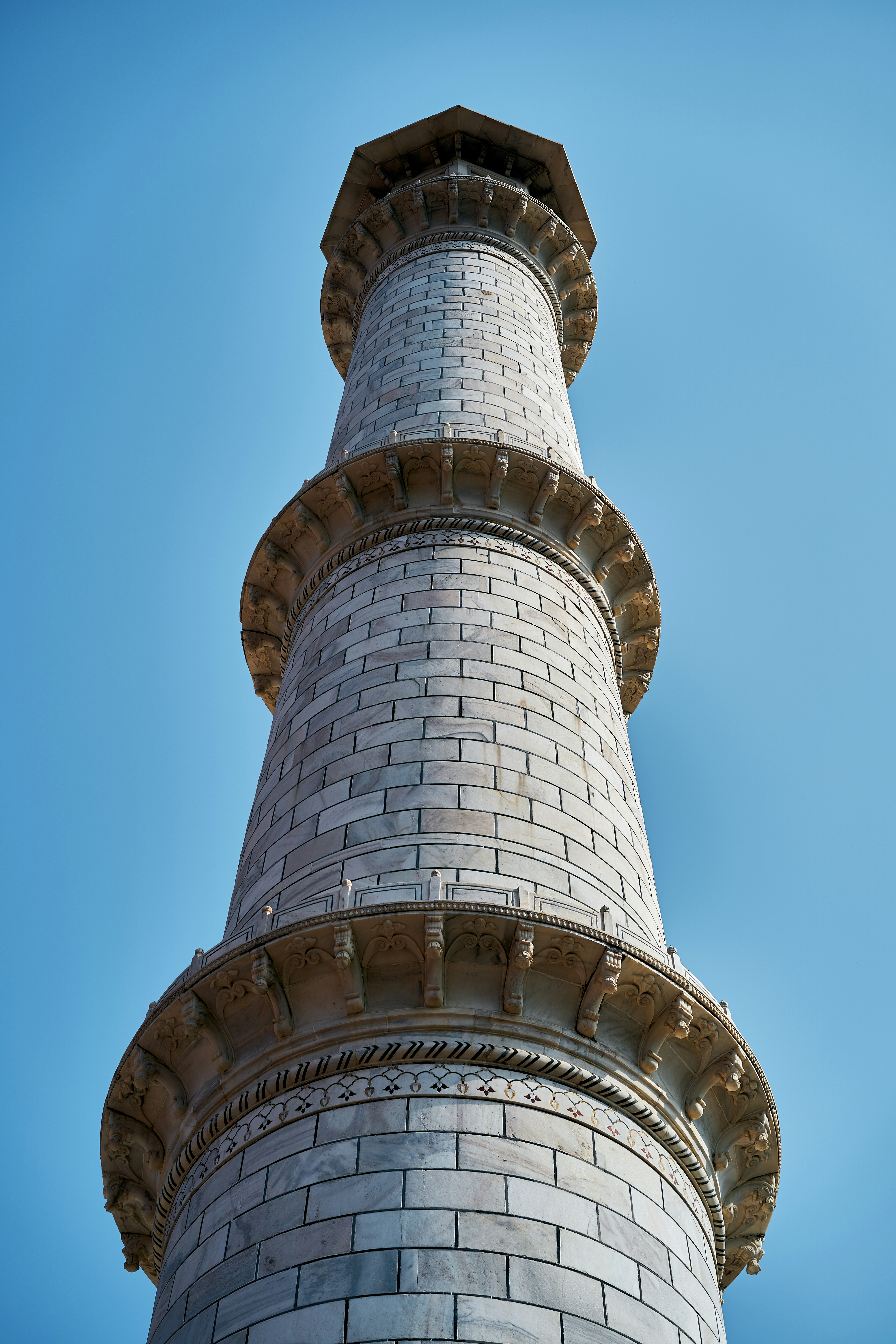 Vertical Sentinel: A Stone Tower Reaching Toward the Sky