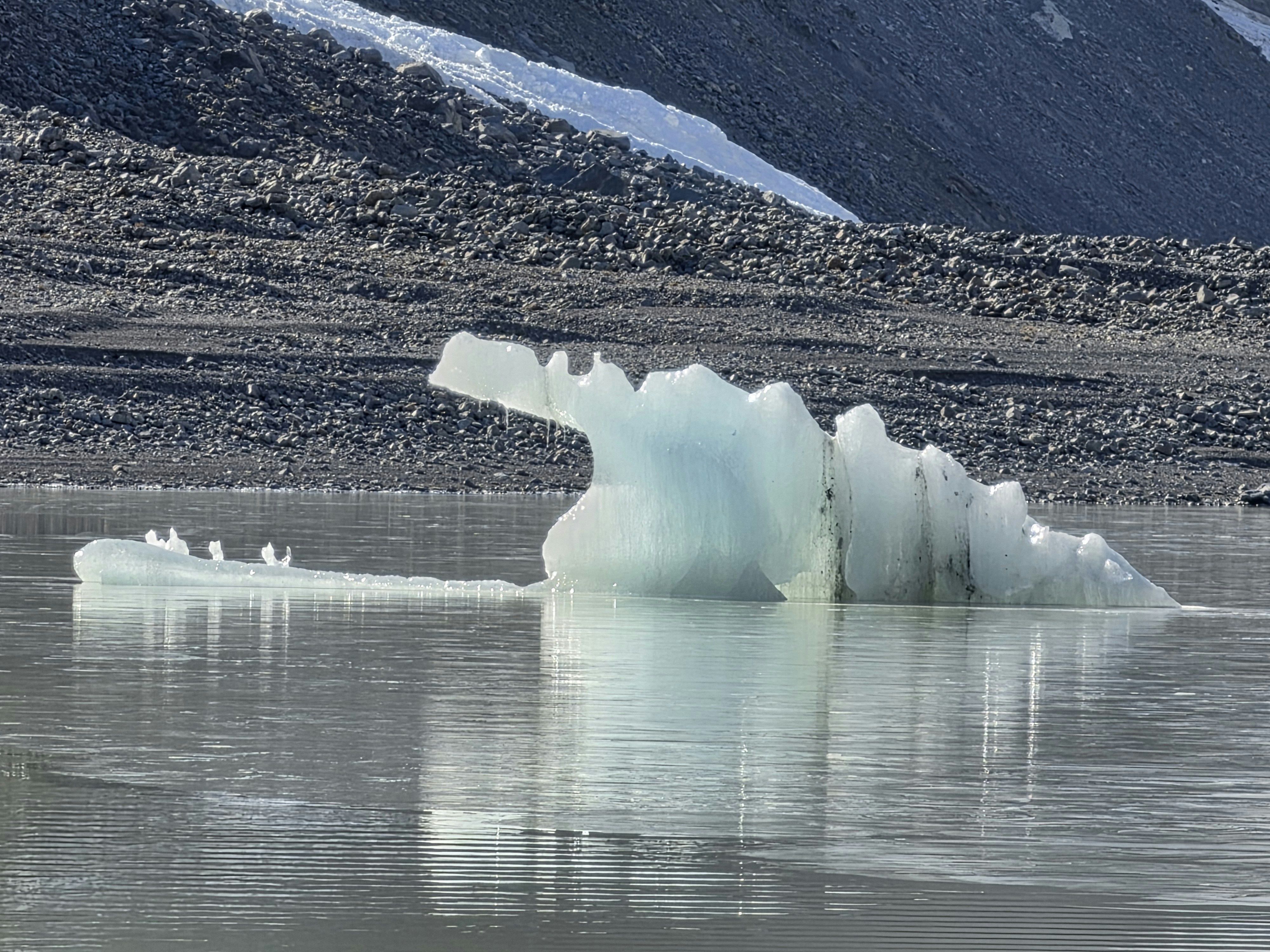 Ice Lip Archway on a Glassy Fjord