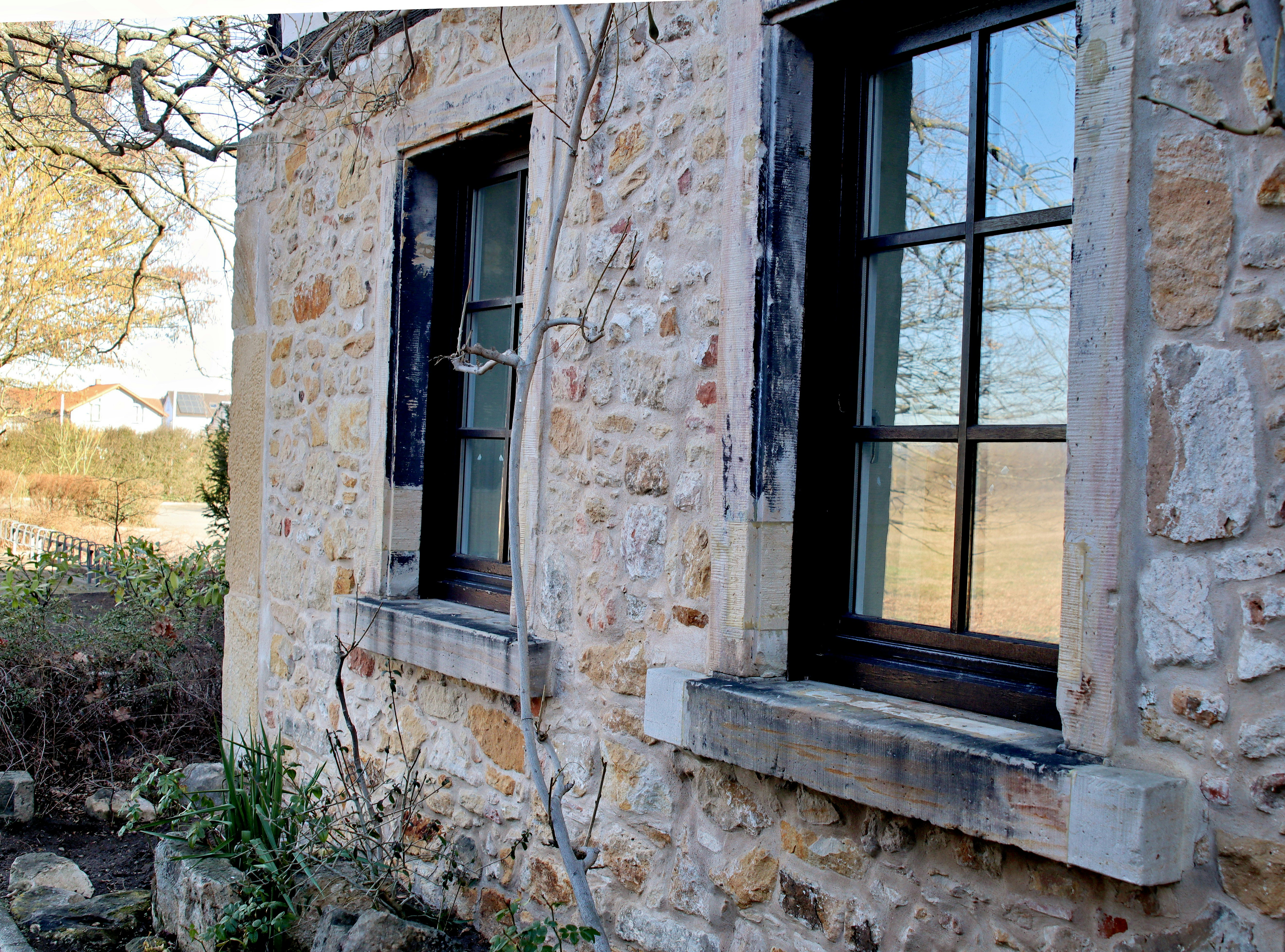 Stone Cottage with Narrow-Window Details