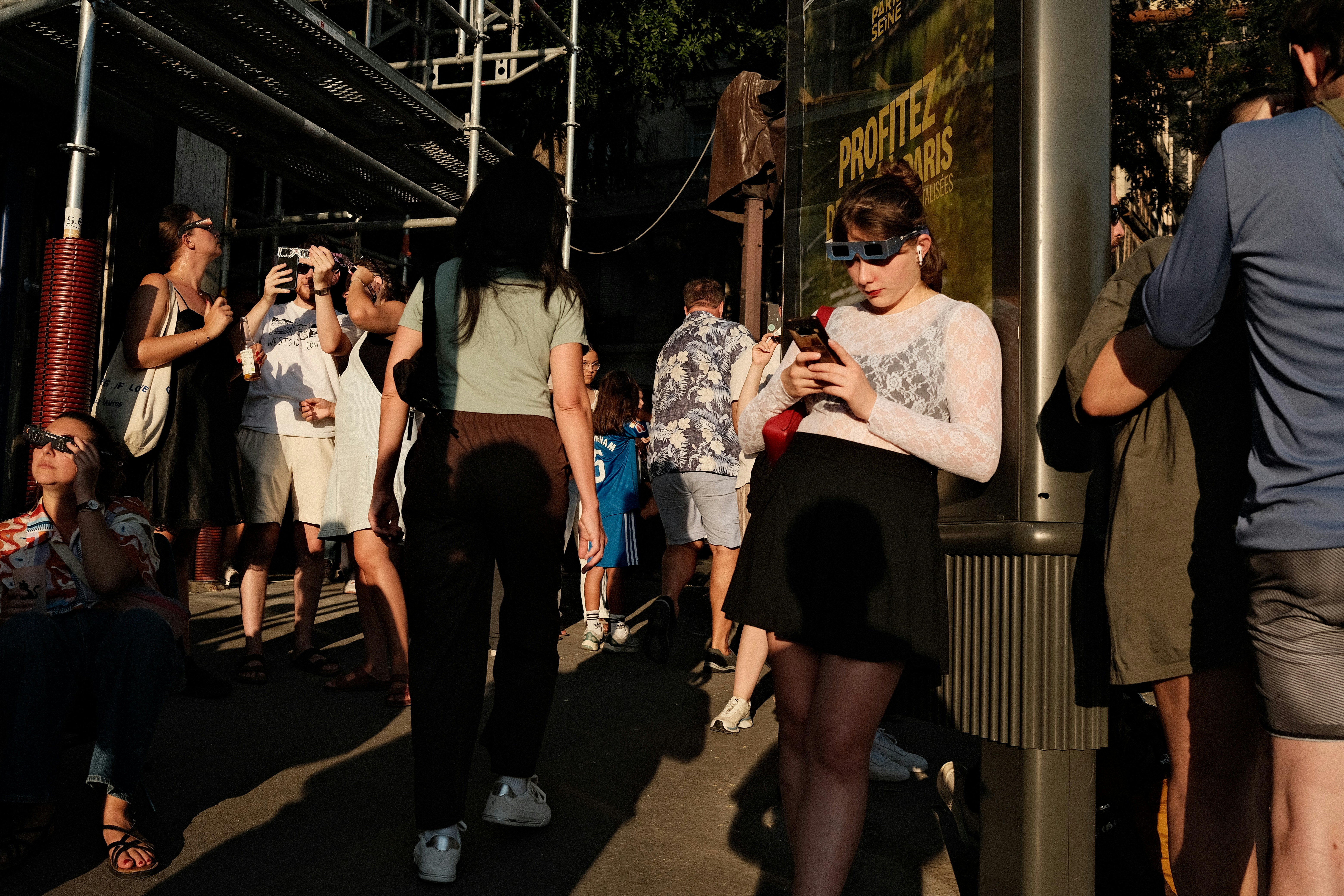 Her Light in the Crowd: A Quiet Moment Amid the City Pulse