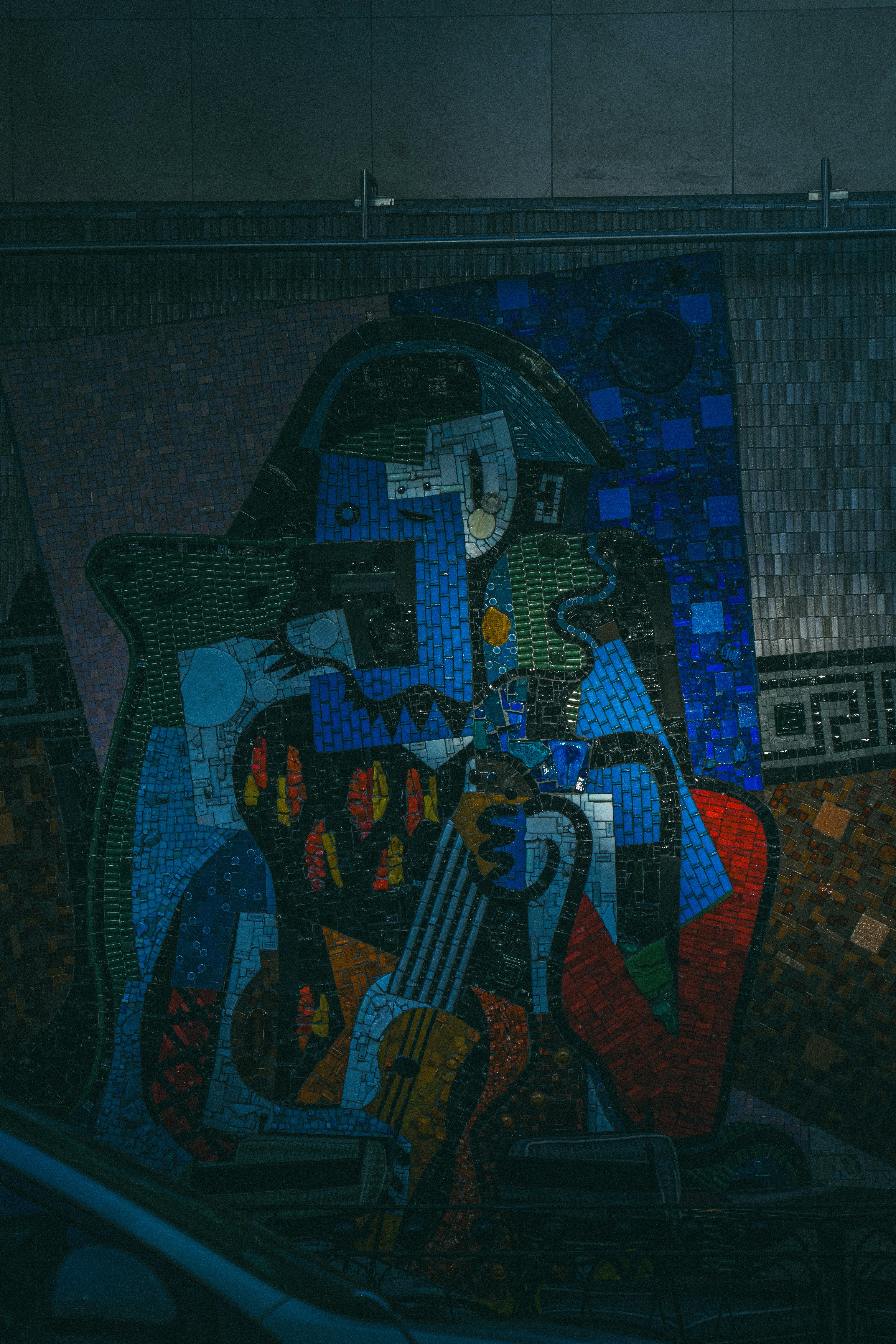Mosaic Blues: A Guitarist’s Portrait in Tiles