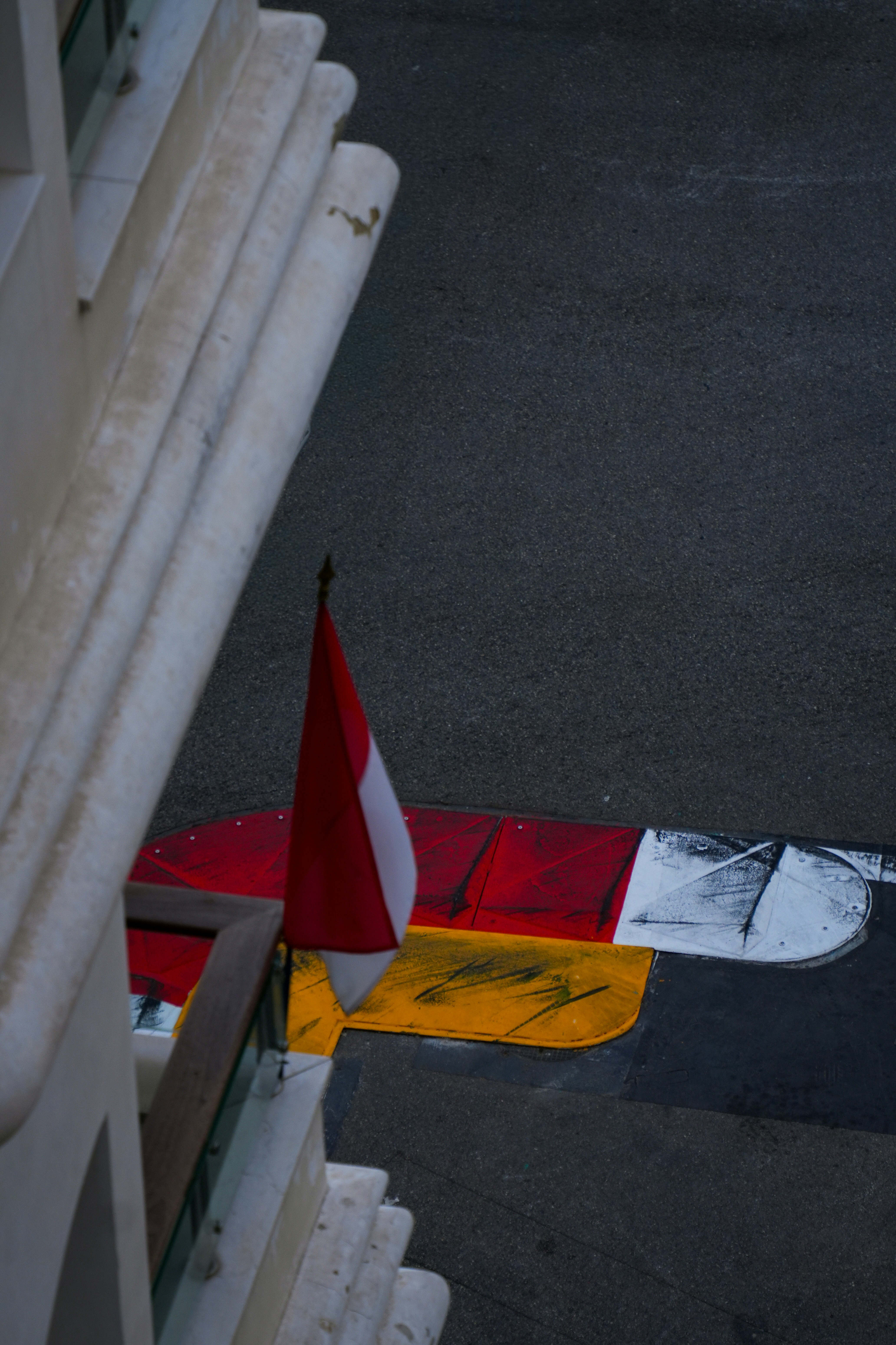 Red Flag at the Stairwell Edge