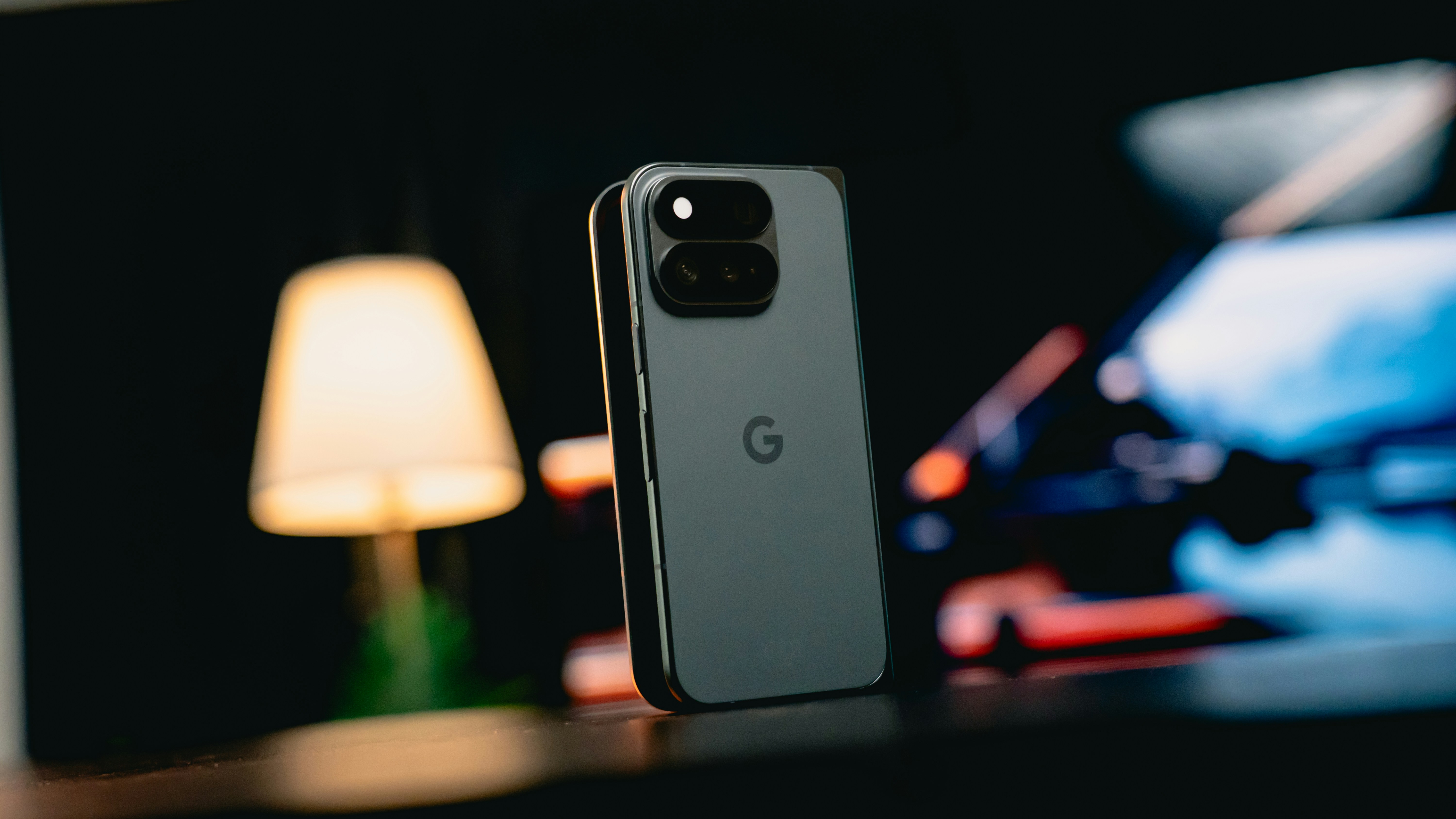 G-Phone on a Quiet Stage: A Glowing Desk with a Google Pixel in Focus