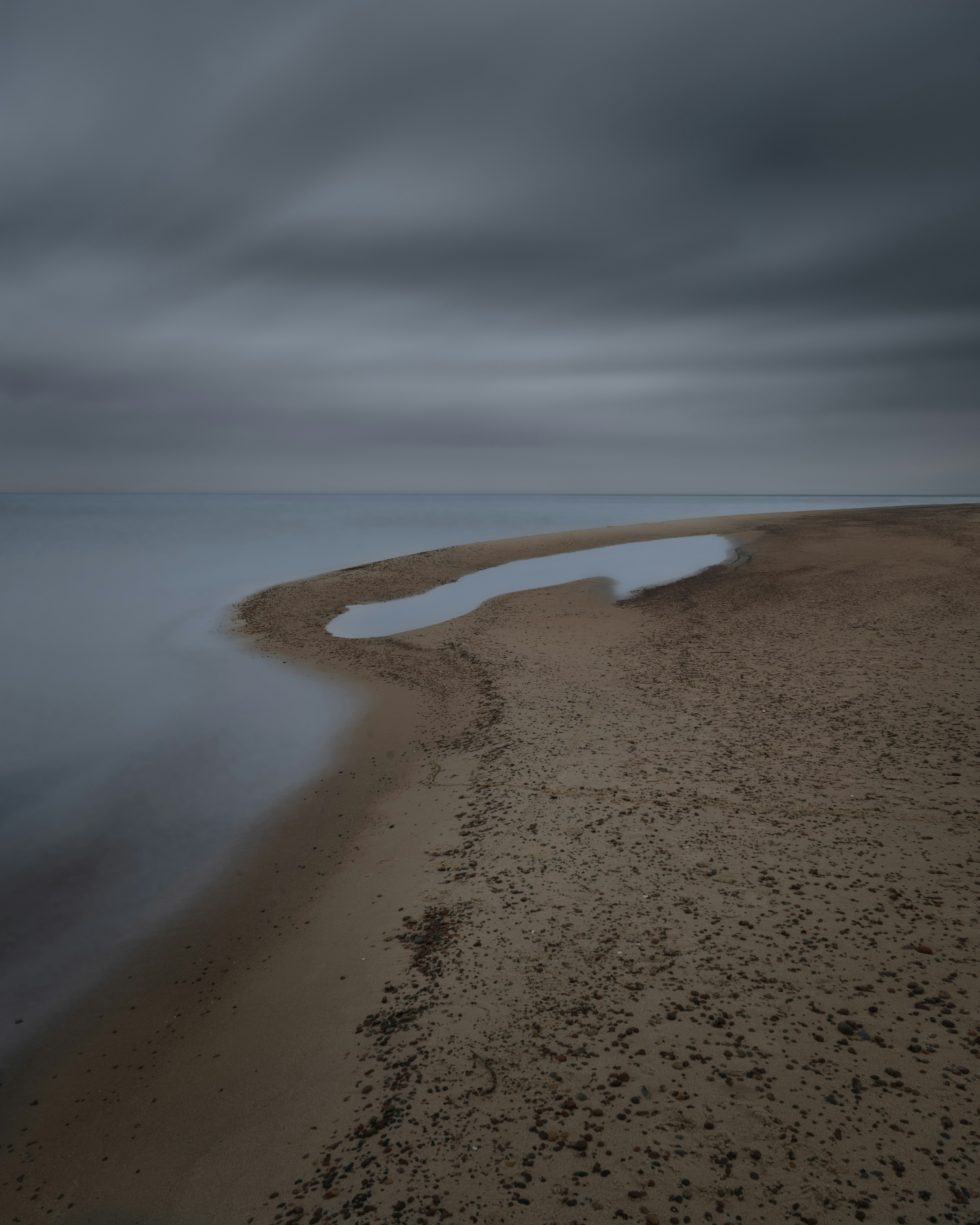 Coastal Curve of Silence at Dusk