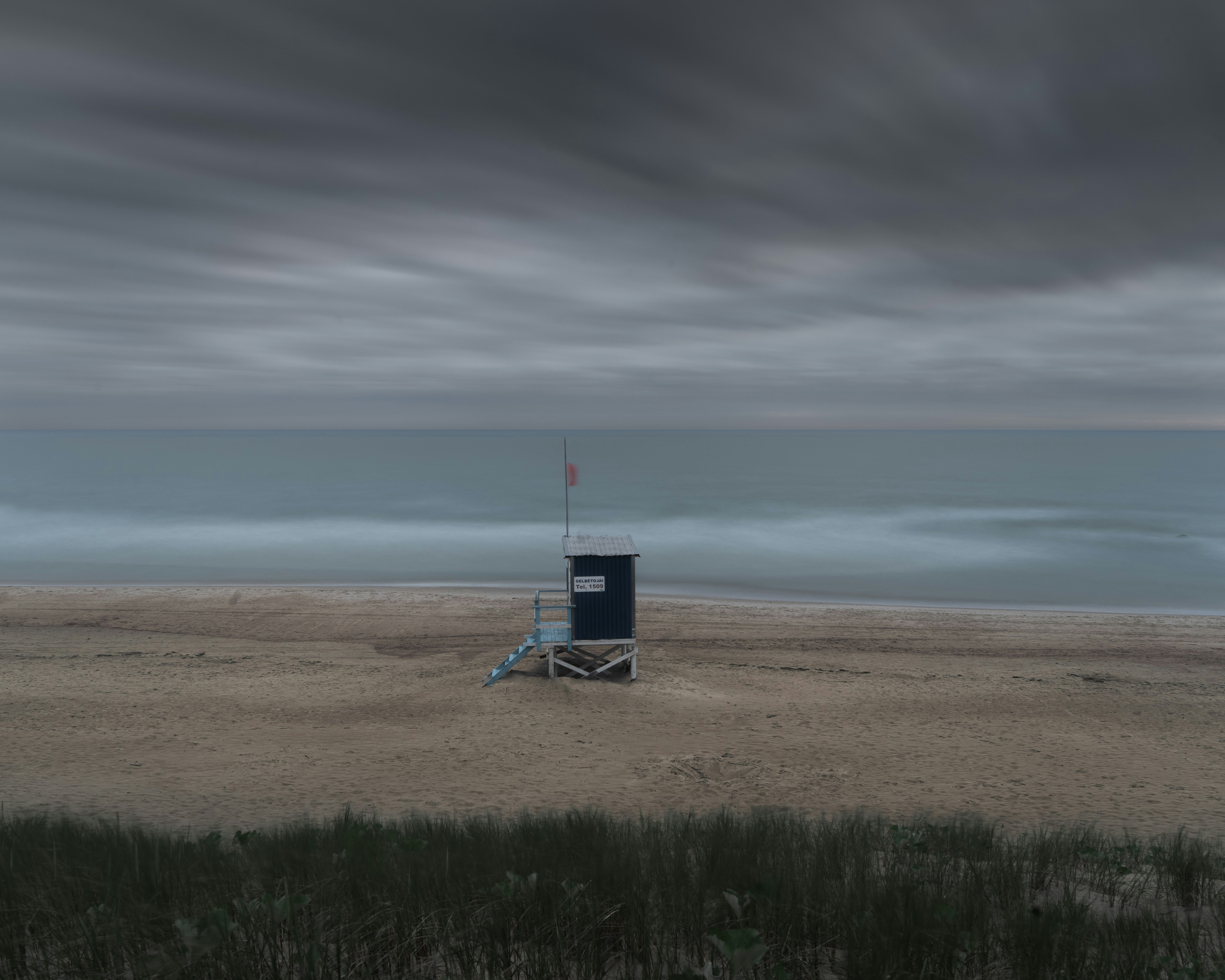 Lifeguard Hut Beneath a Moody Coastal Sky