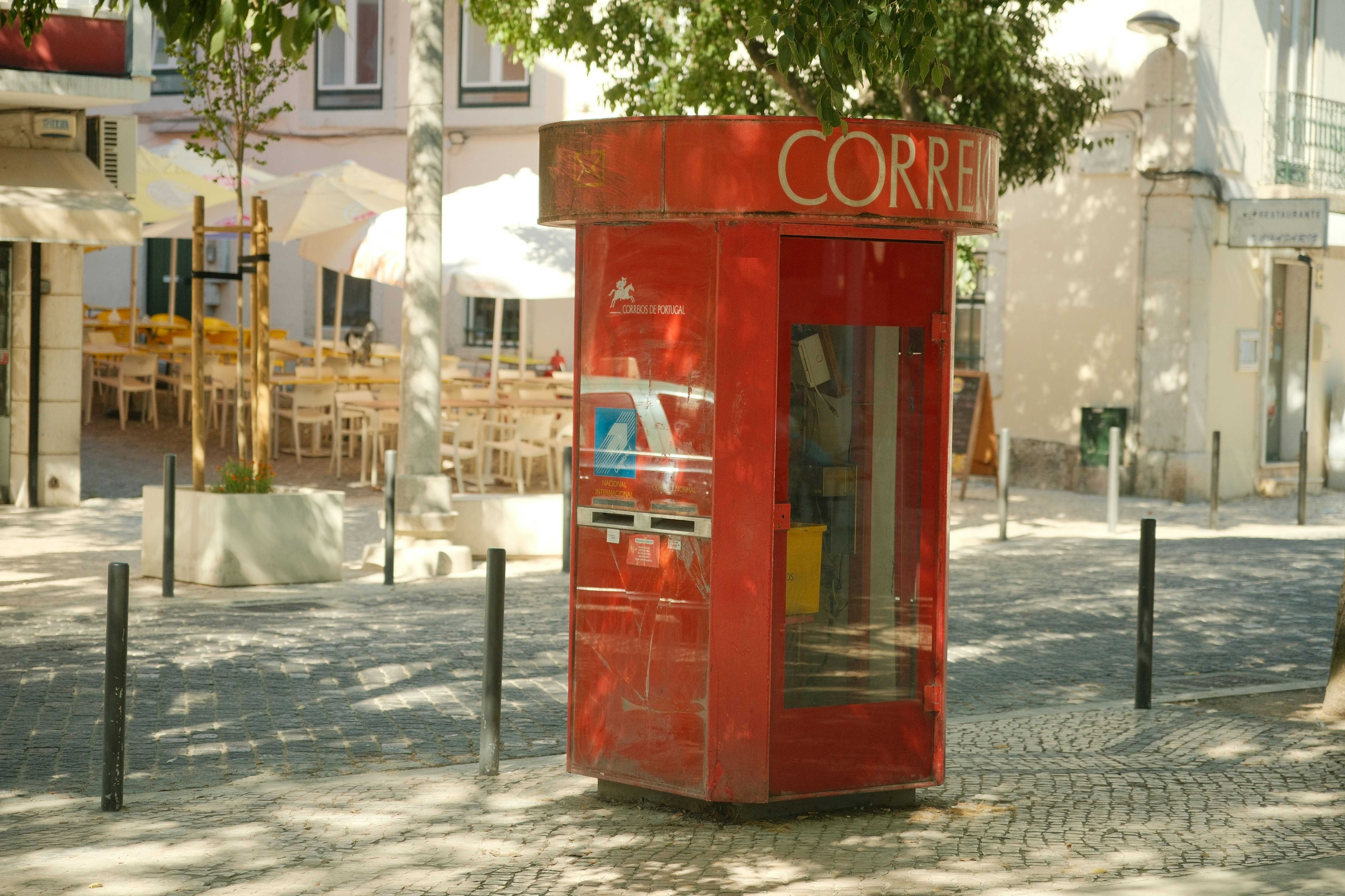 Red Postbox in a Quiet European Square