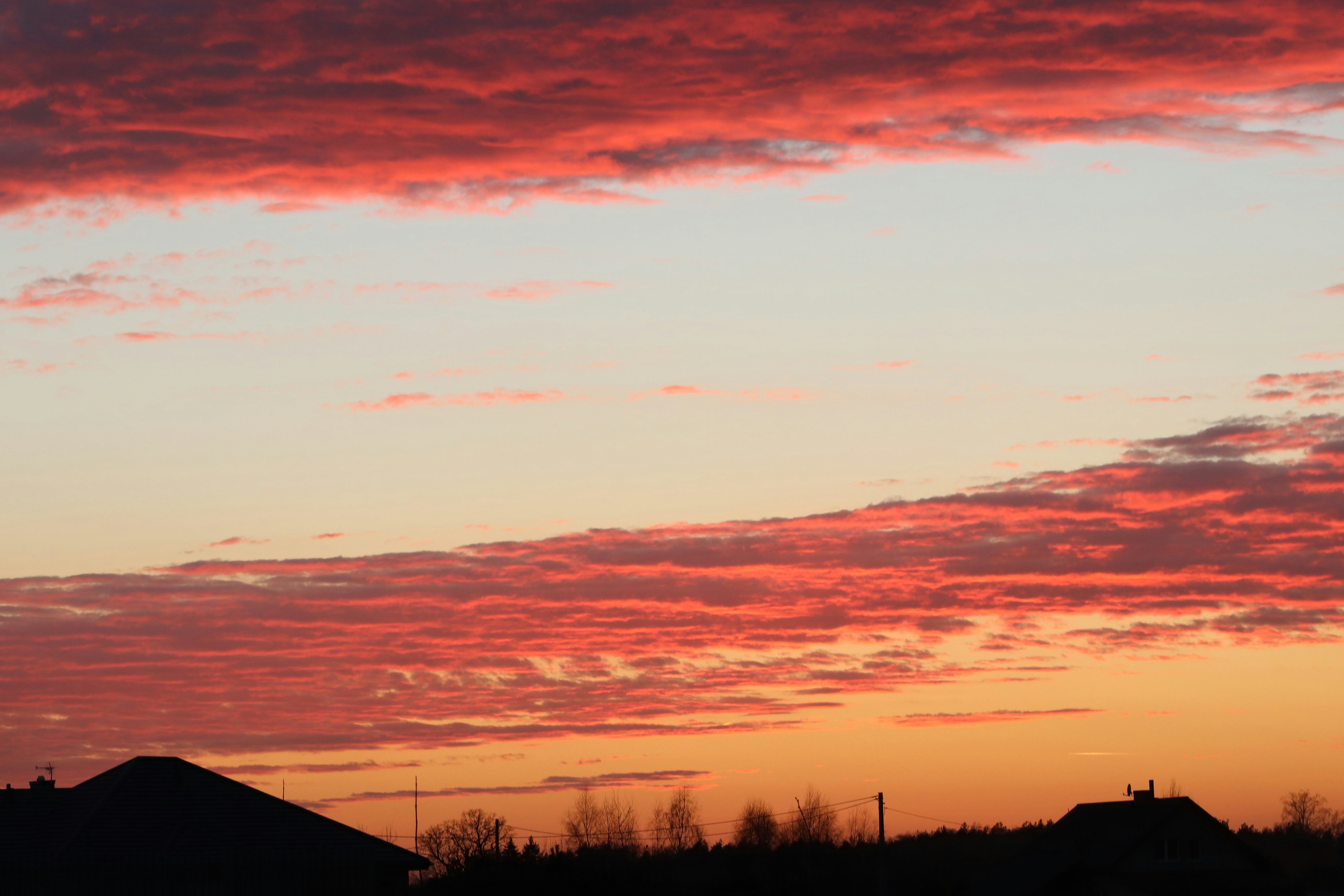 Sienna Skyline at Dusk: A Quiet Horizon Bursts with Color