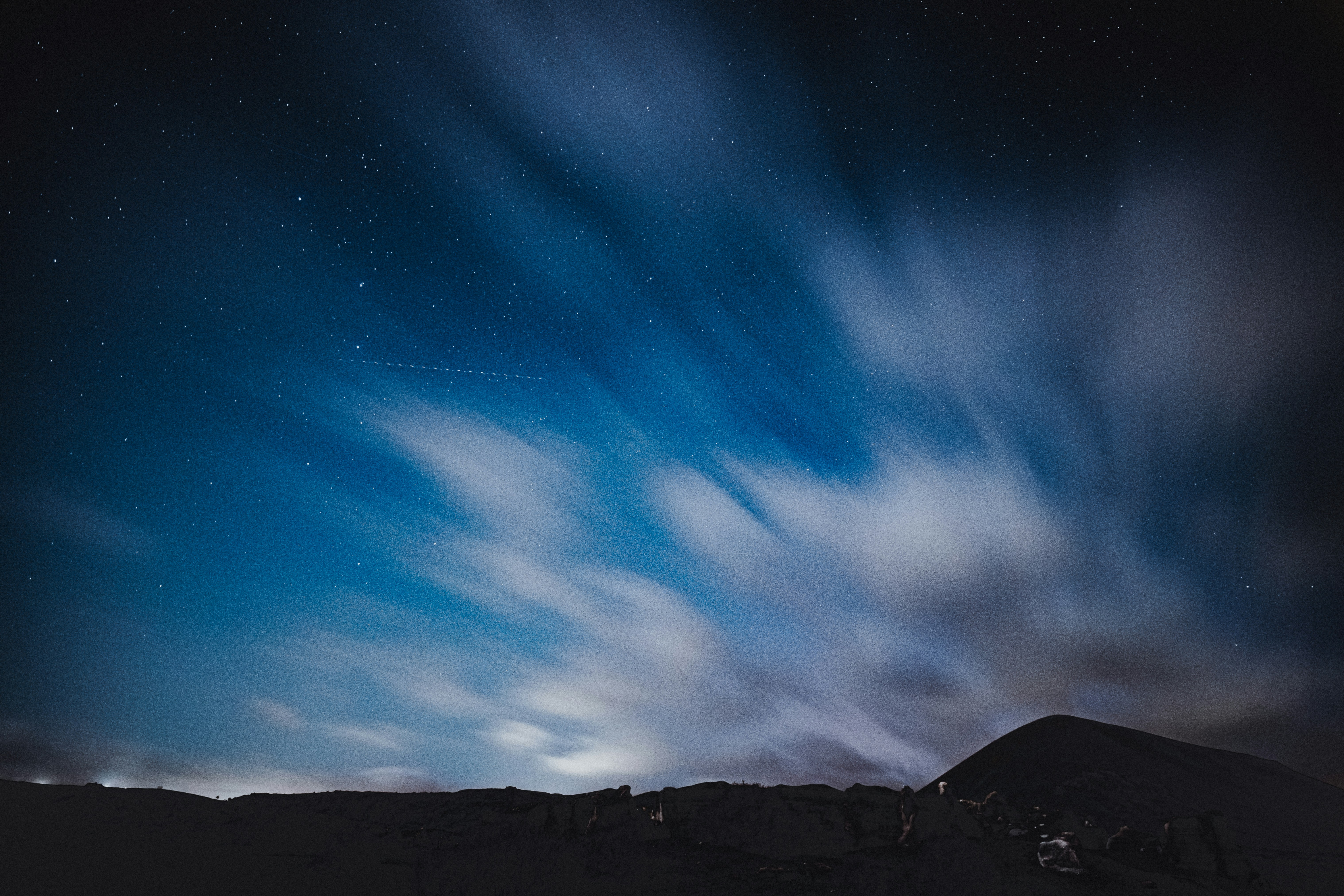 Silent Gale Over the Ridge: A Starry Night Above a Quiet Dunescape