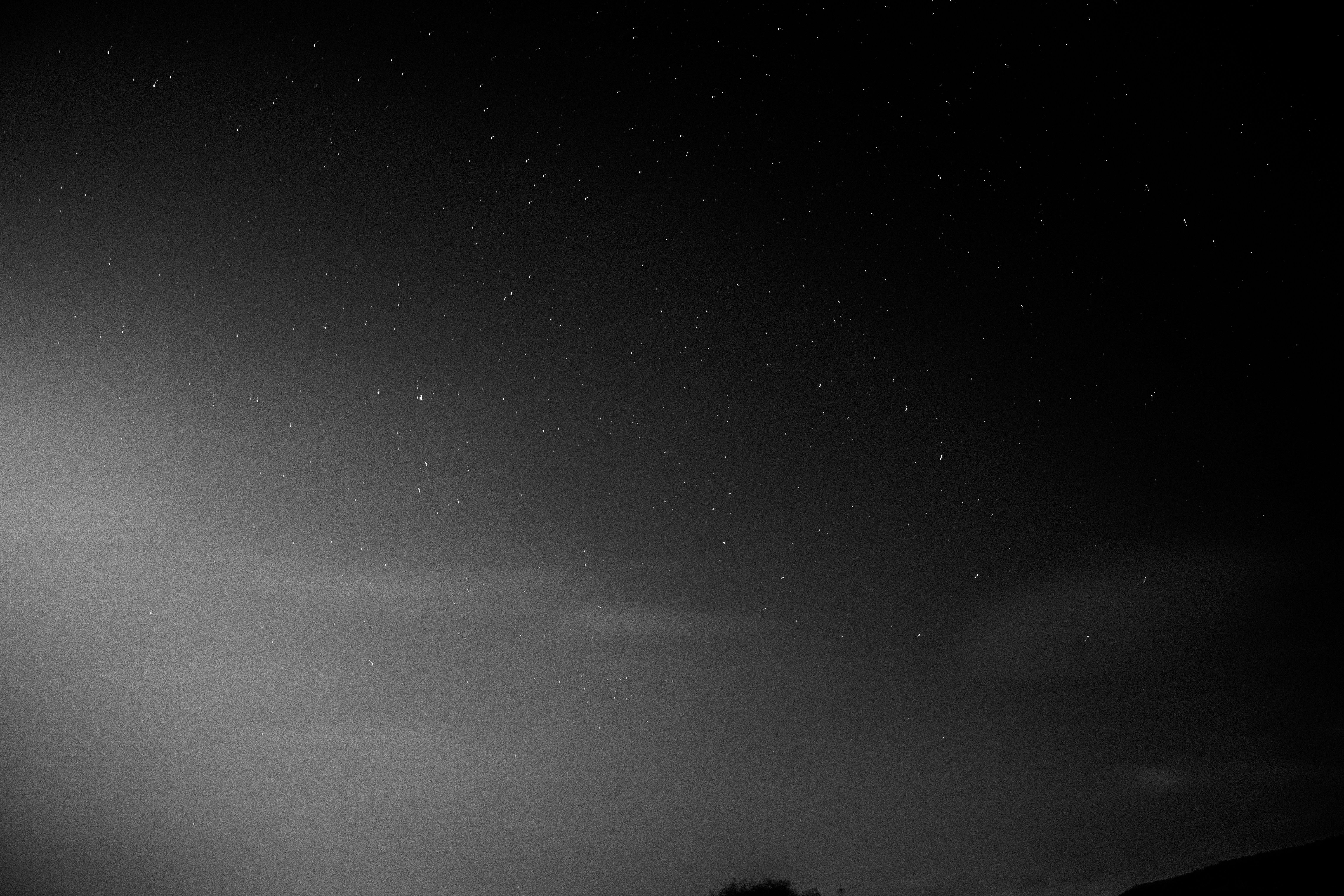 Starlit Horizon over Quiet Hills