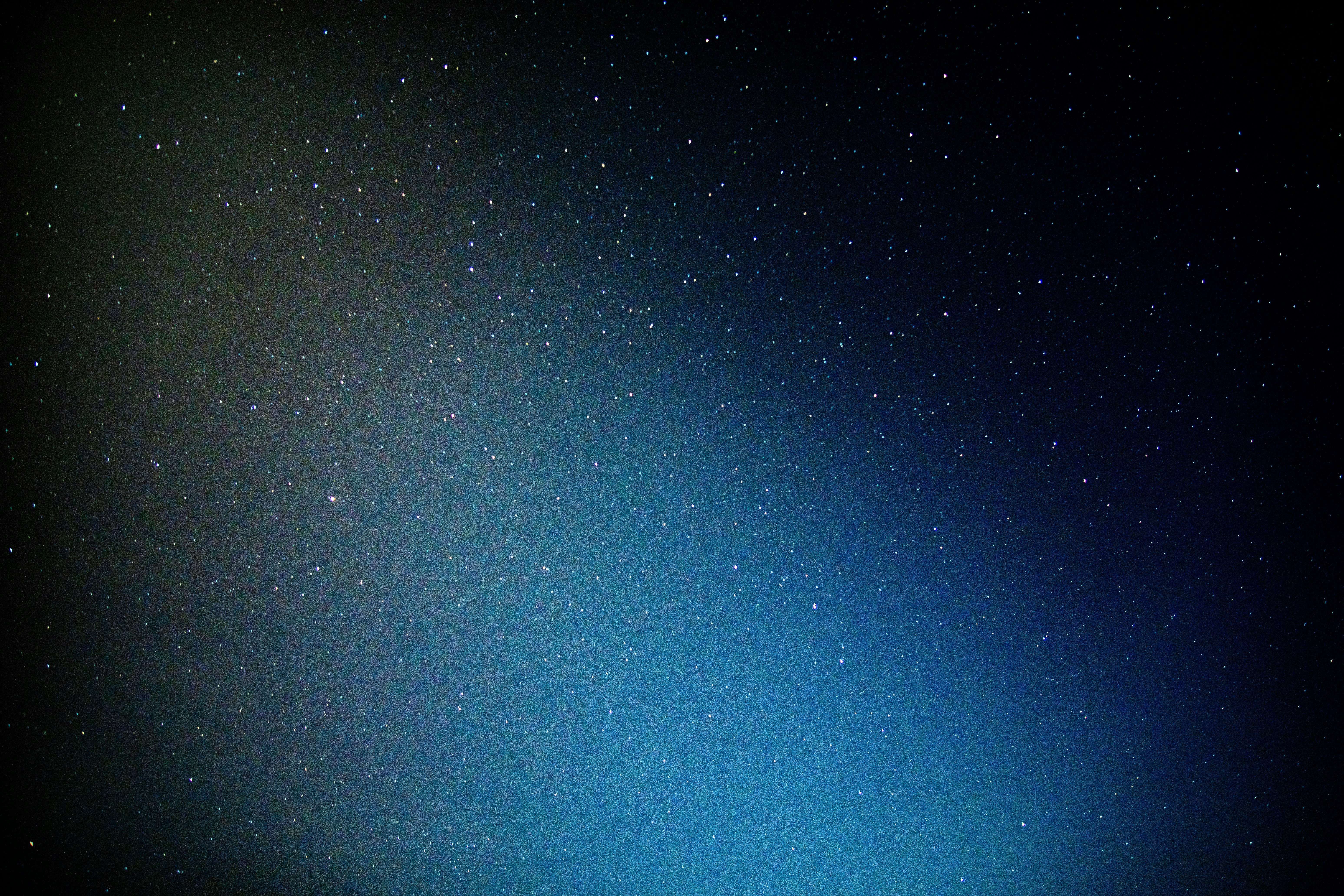 Aurora of Nightfall: Starfield over Blue Nebula