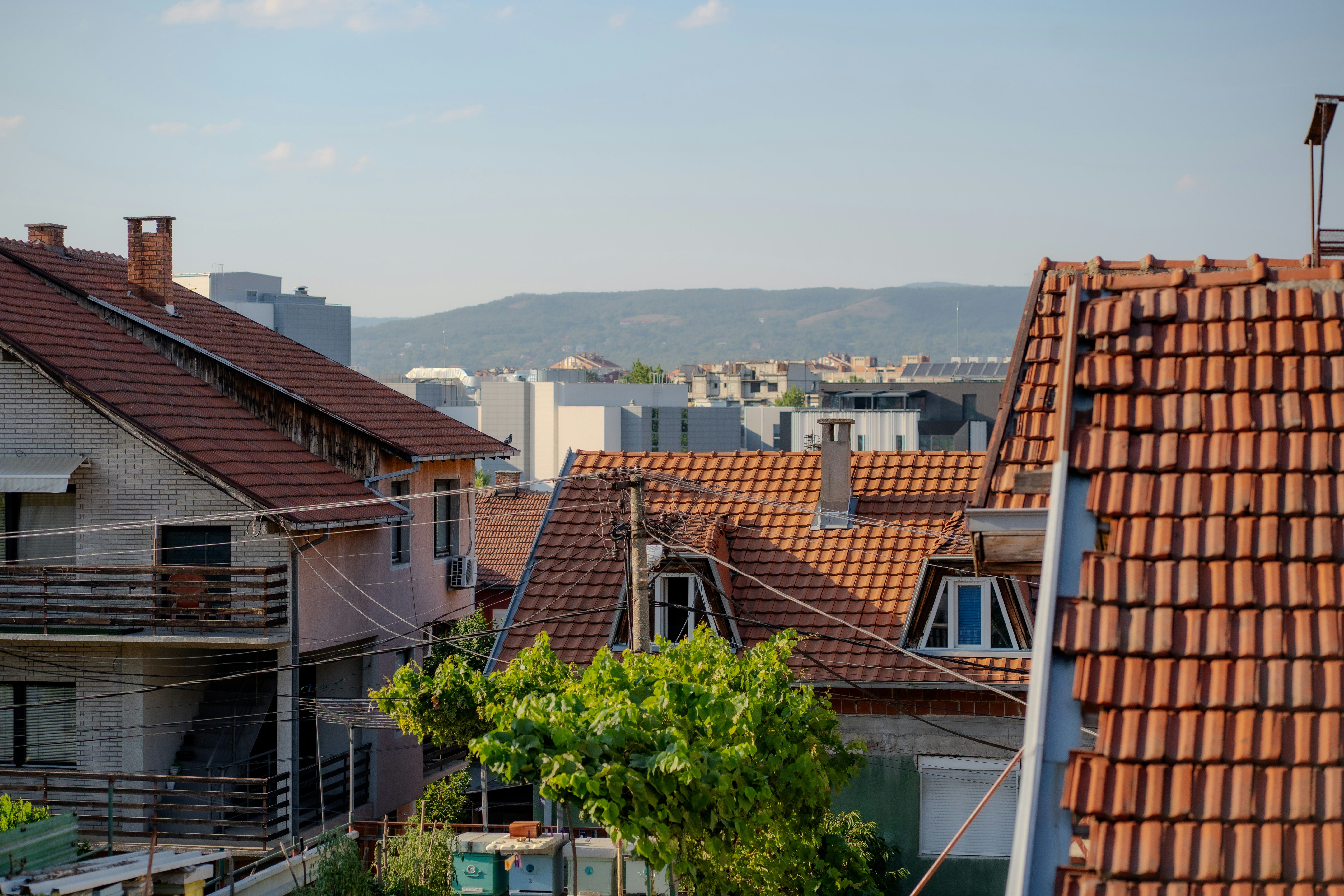 Rooftop Mosaic Under a Calm Urban Sky